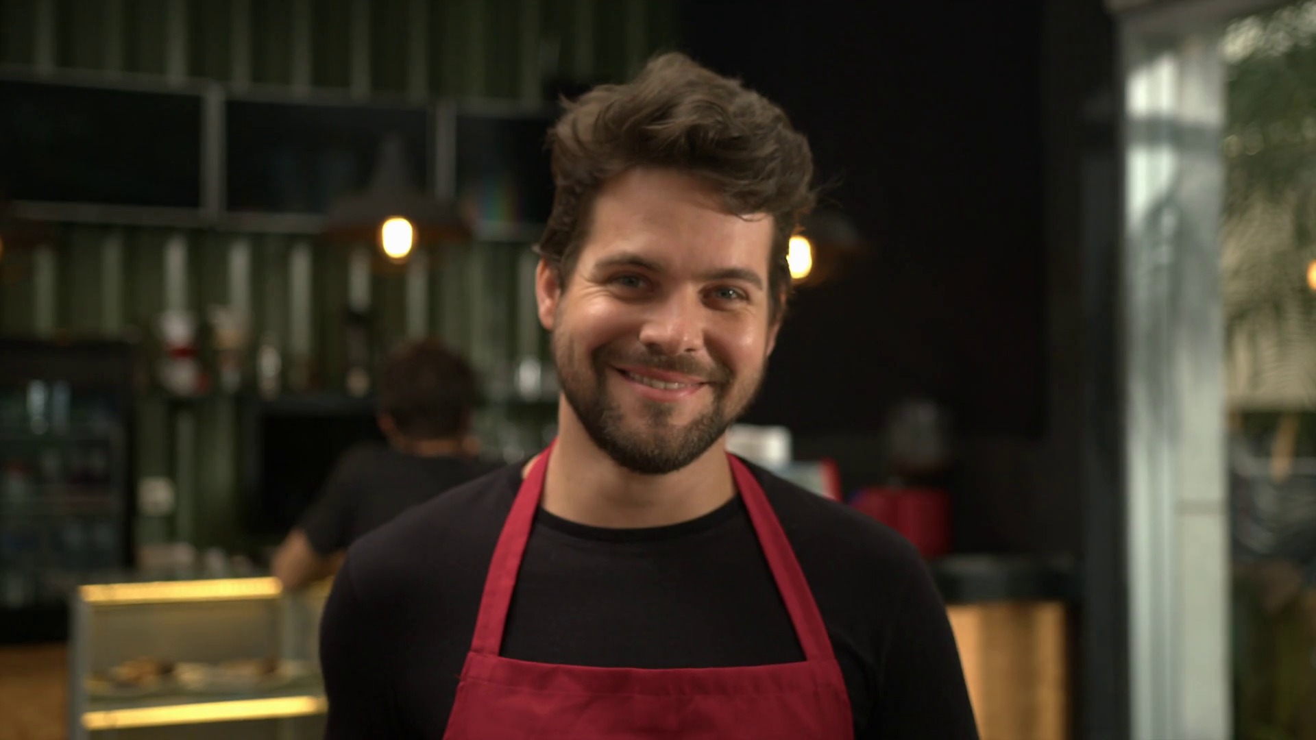 Café Charm: Smiling Young Barista Poses Stock Footage SBV-348403937 ...