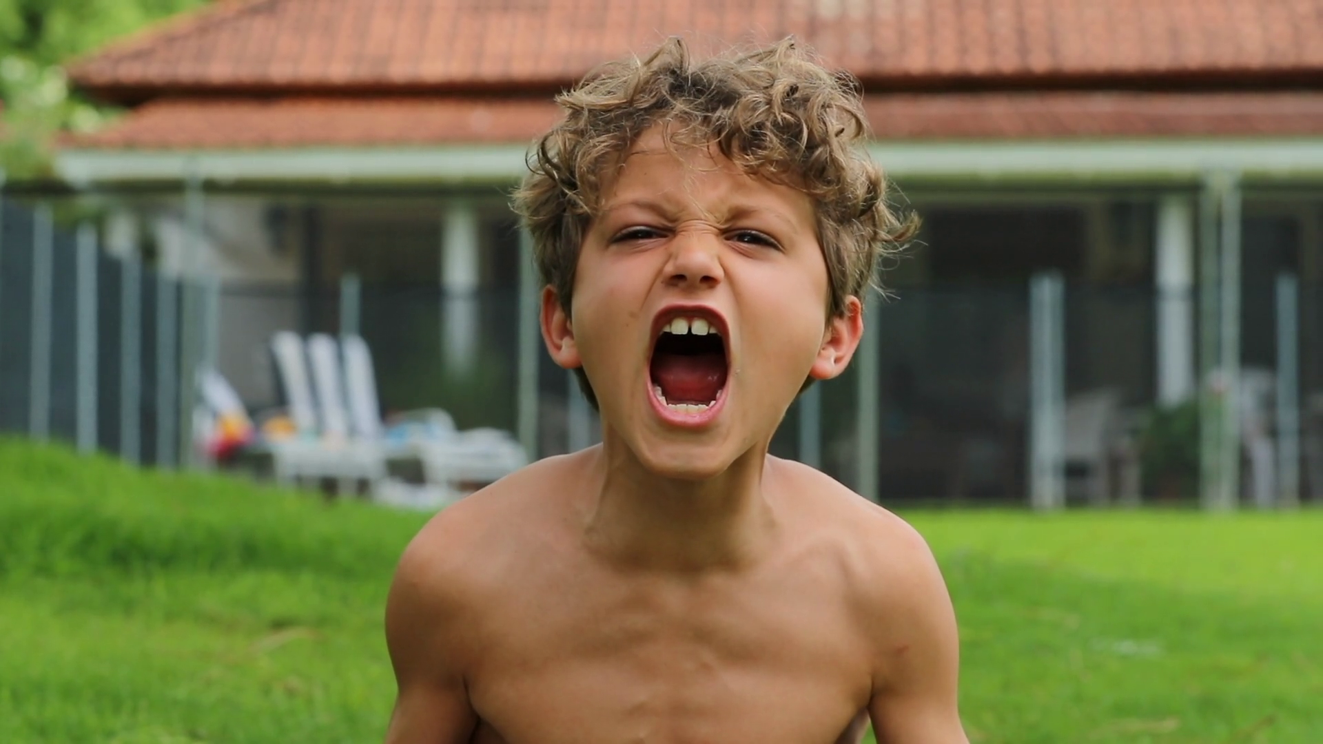 Portrait Of Young Boy Shouting In Slow Stock Footage SBV-352405074 ...
