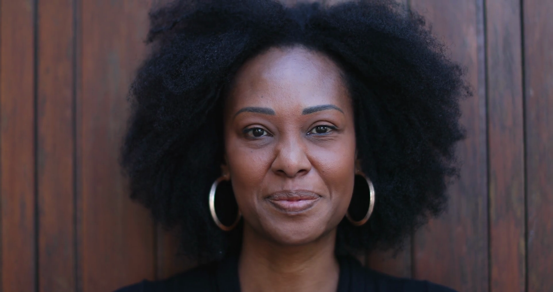 Positive African Woman Smiling At Camera Stock Footage SBV-348492716 ...