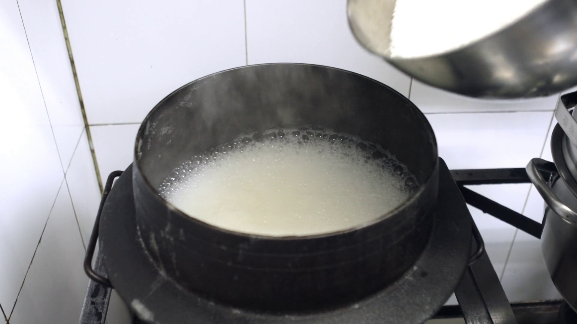Pouring Rice Inside Pot Filled With Boiling Stock Footage SBV-348478032 ...