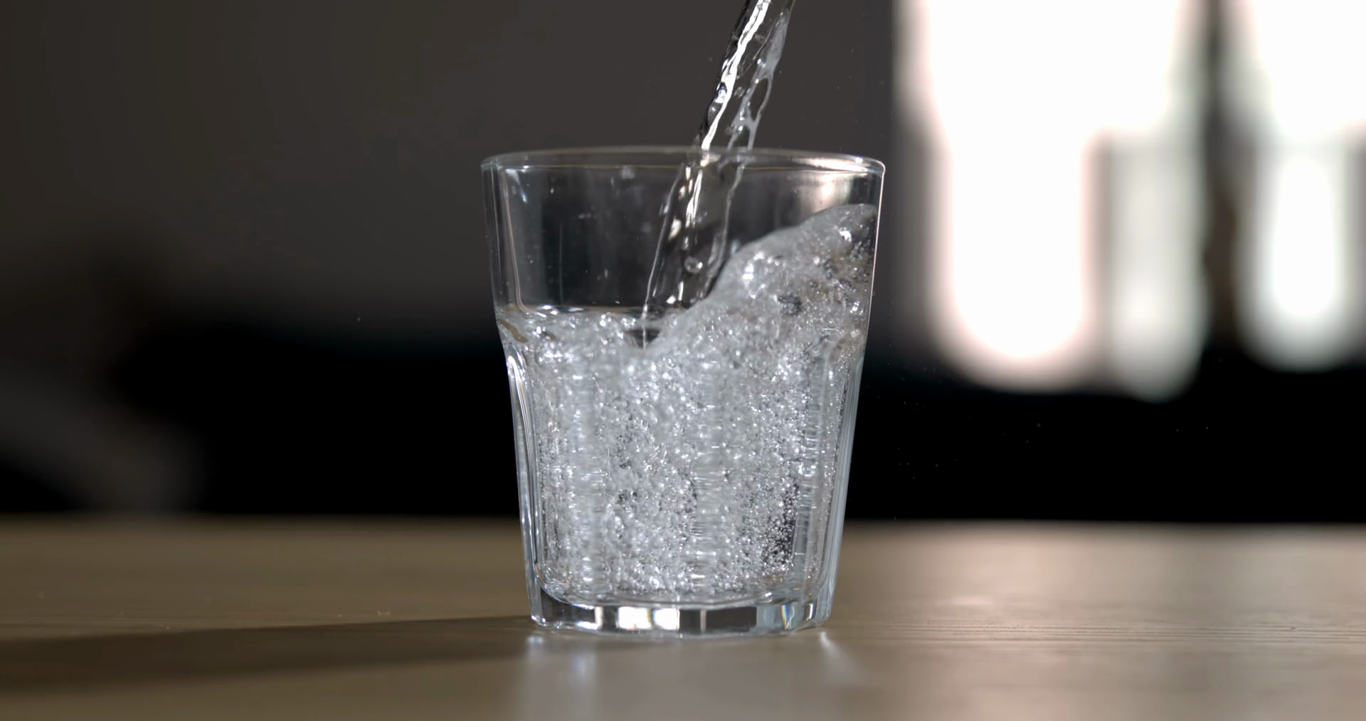 Pouring Sparkling Water Into Glass In Super Stock Footage SBV-348483650 - Storyblocks
