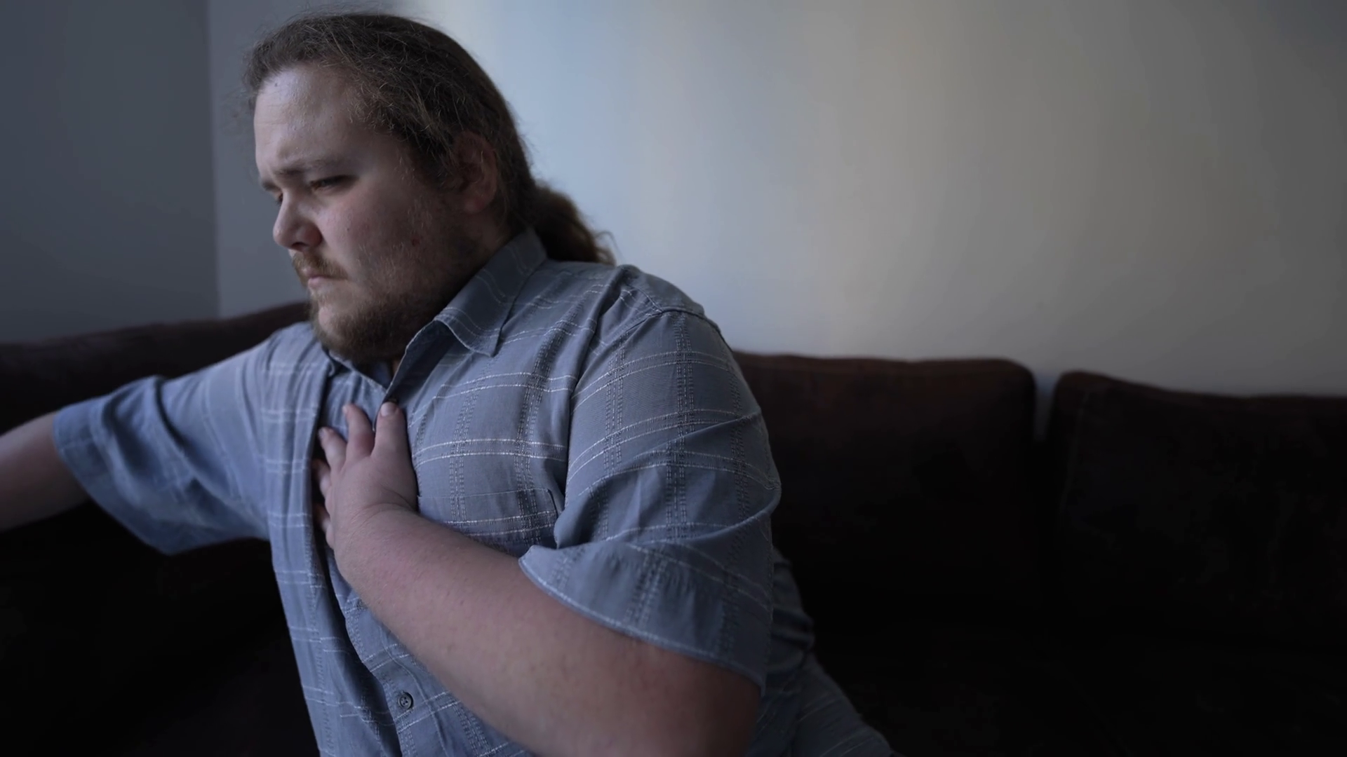 Health Struggle: Young Man Lays On Couch Stock Footage SBV-348442275 ...