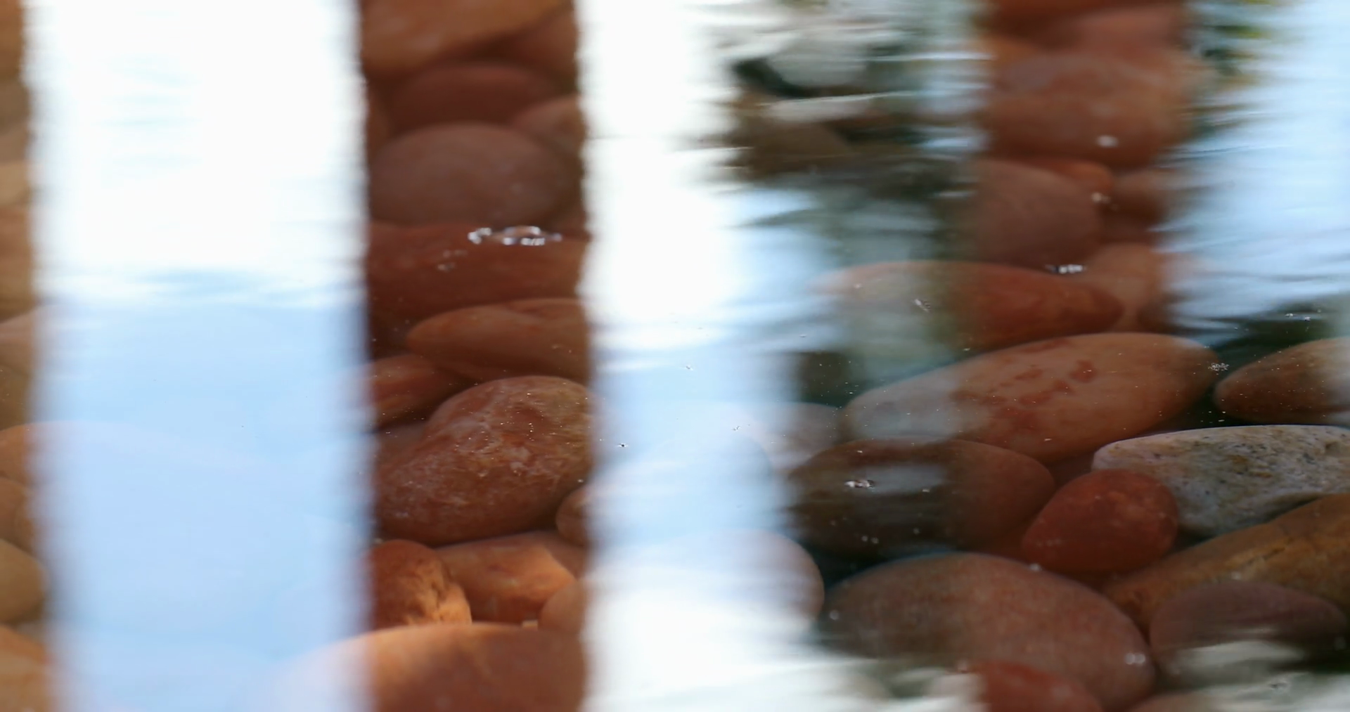 Rocks Under Water With Sky Reflected On Stock Footage SBV-348611186 ...