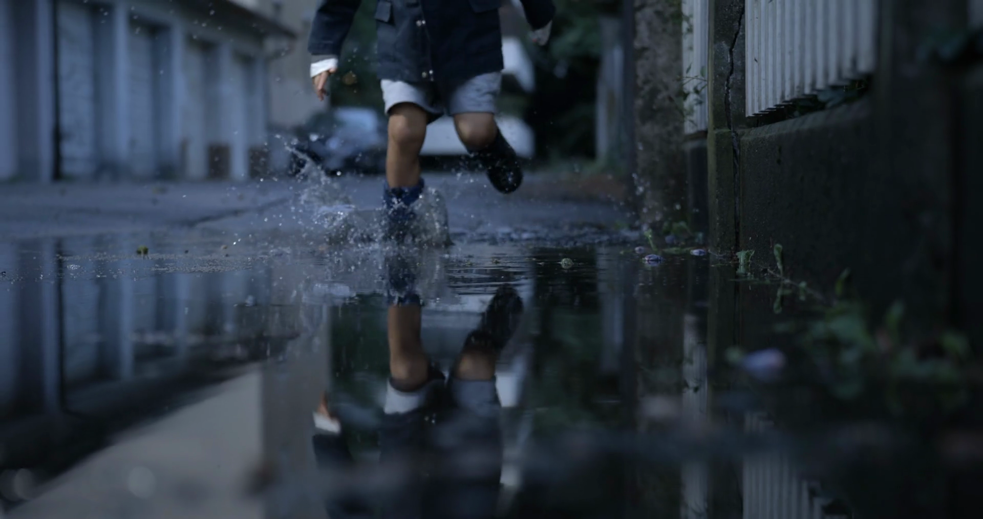 Joyful Child Sprinting In Puddles Splashing Stock Footage SBV-348514035 ...