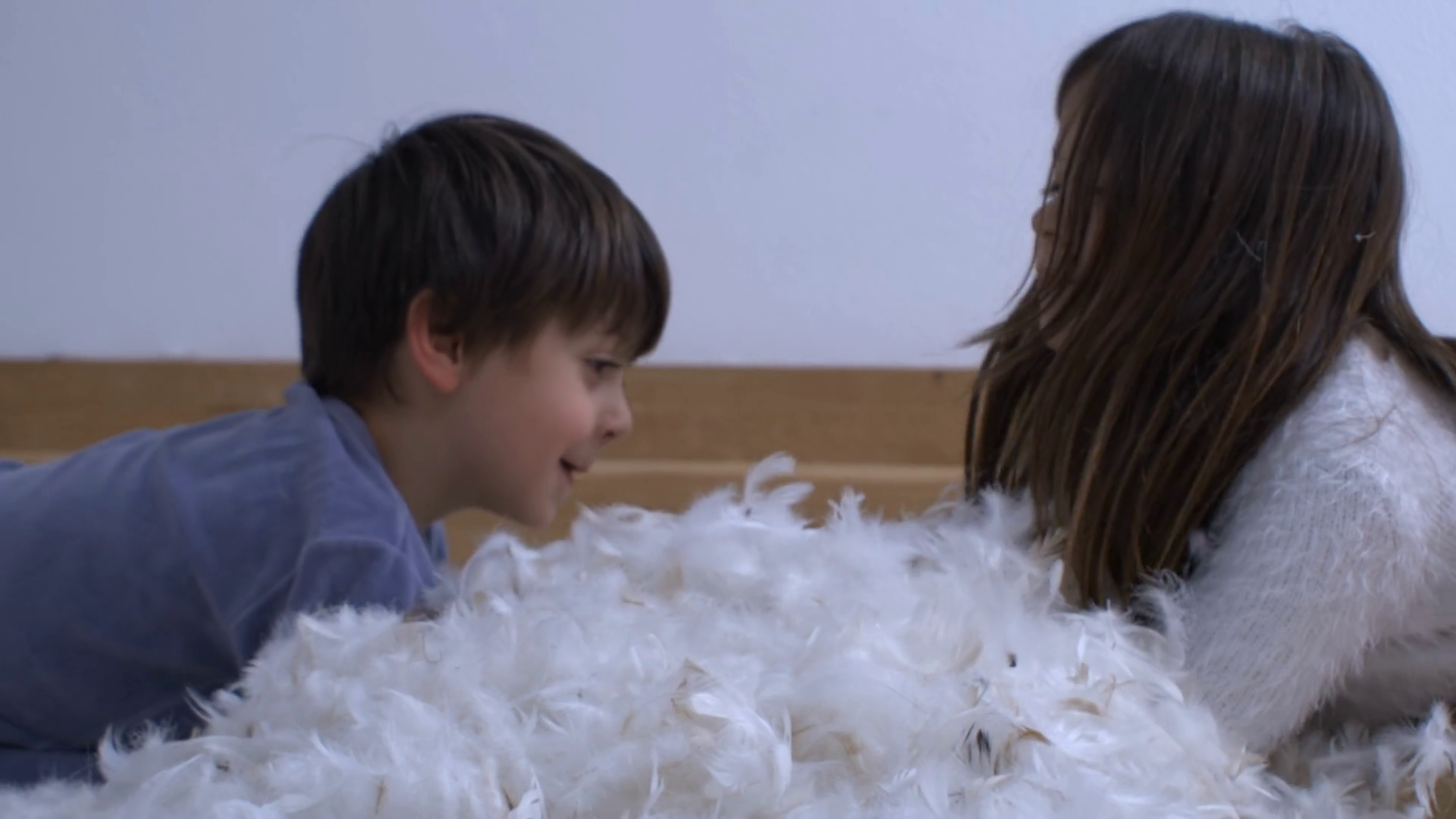 Siblings Throwing Thousands Of Feathers Into Stock Footage SBV ...