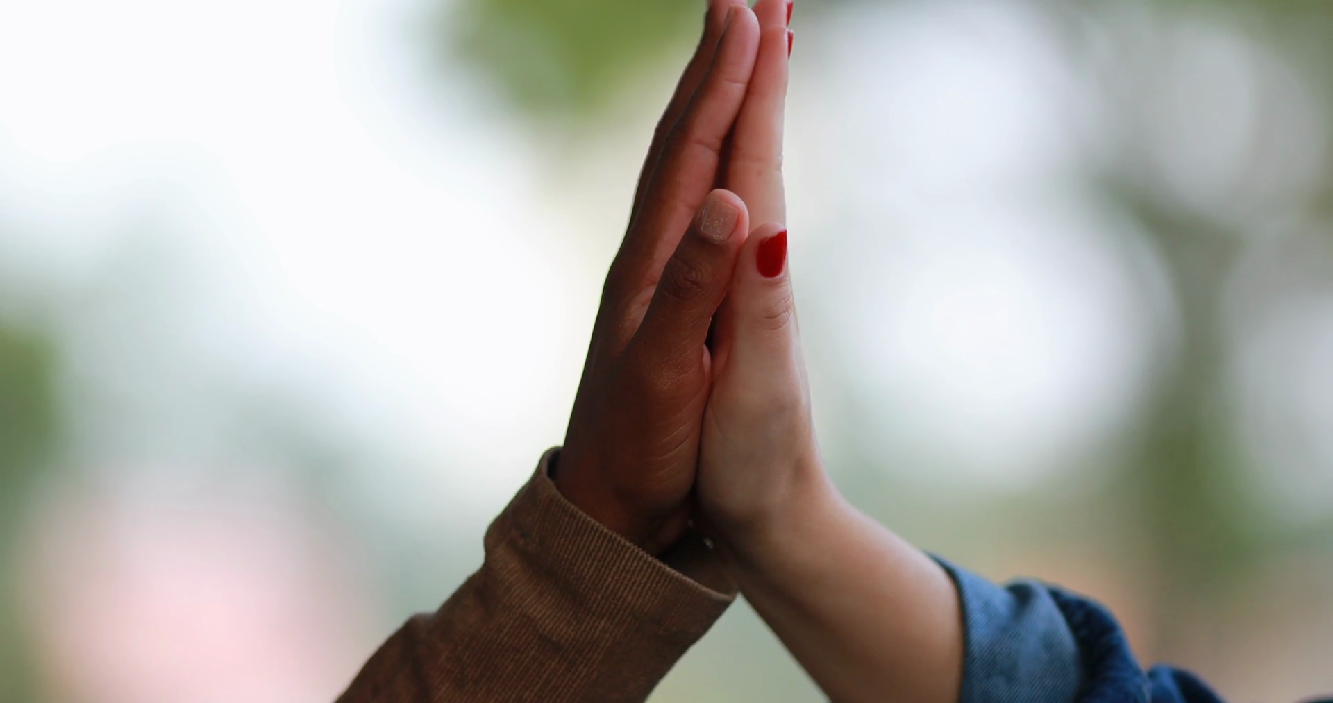 Two Diverse Hands Joining Force In Unity Two Stock Footage SBV ...