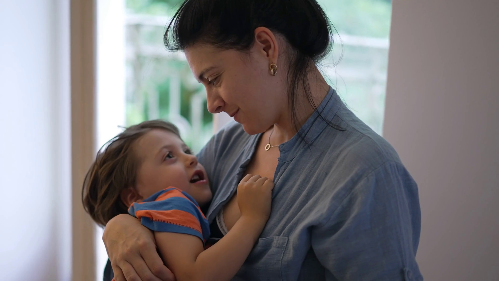 Warm Maternal Embrace Enveloping Young Son Stock Footage SBV-348938338 ...