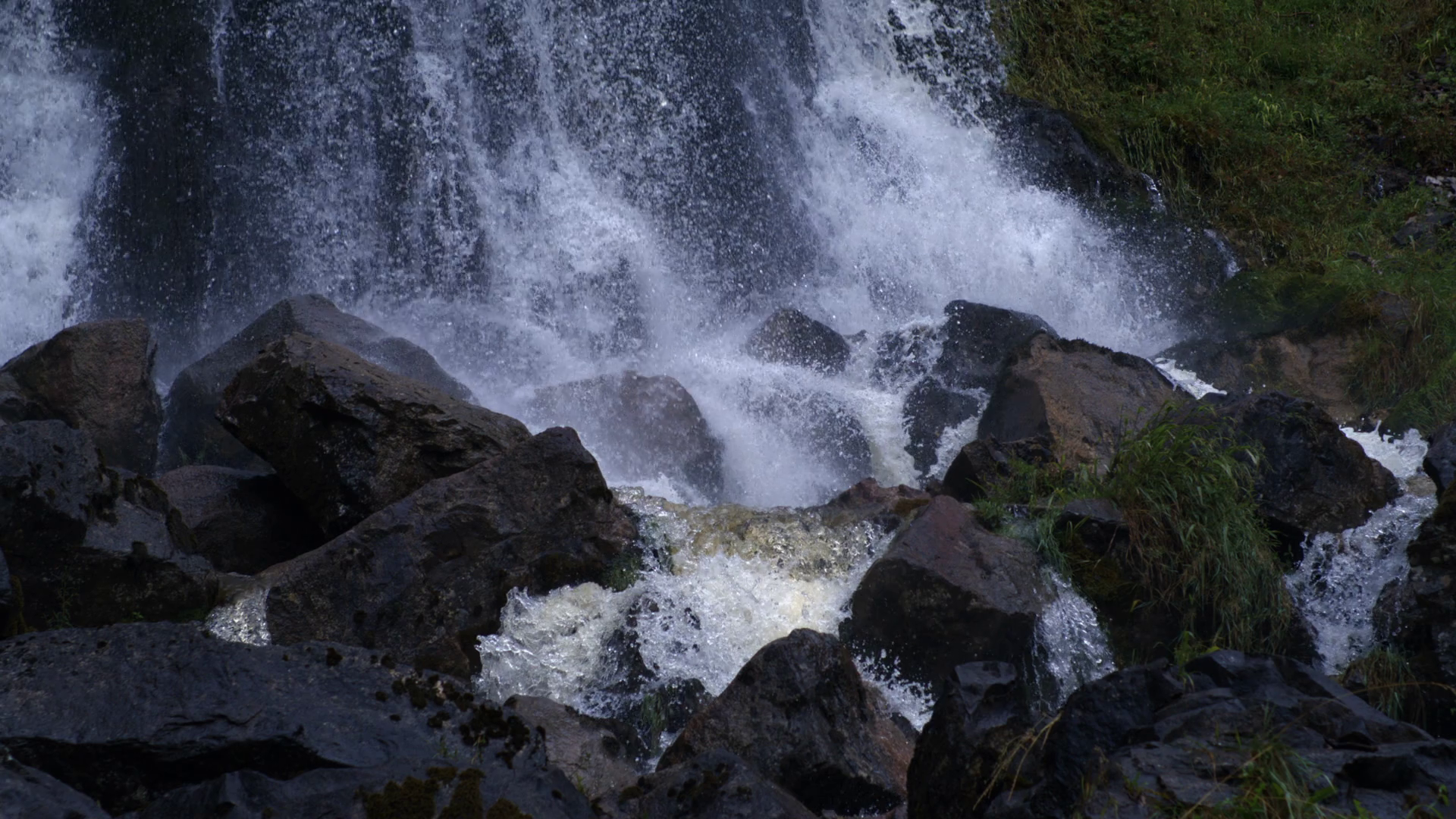 Waterfall Crashing Down On Large Black Rocks Stock Footage SBV ...