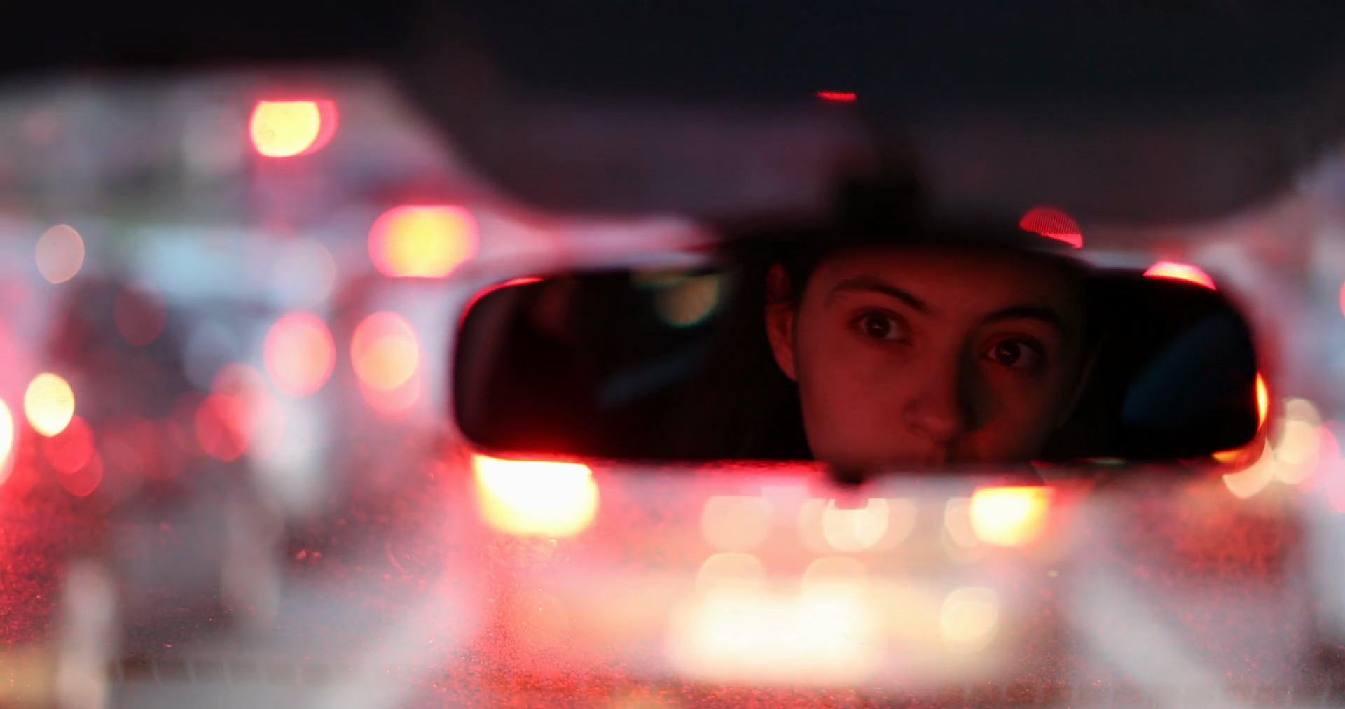 Woman Driver Seen Through Rearview Mirror Stock Footage SBV-348537327 ...