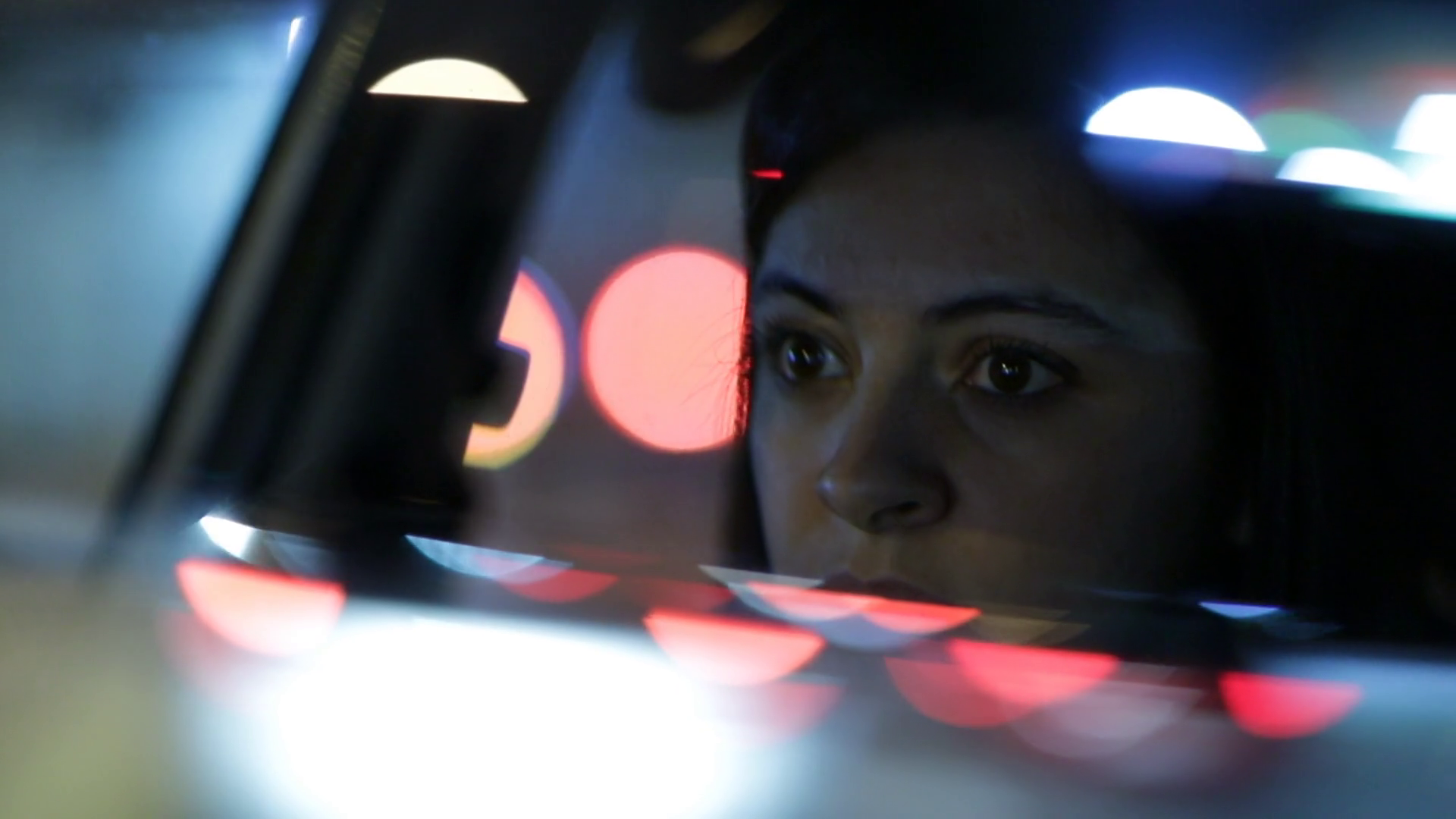 Rear View Mirror Glimpse: Woman Navigating Stock Footage SBV-348481511 ...