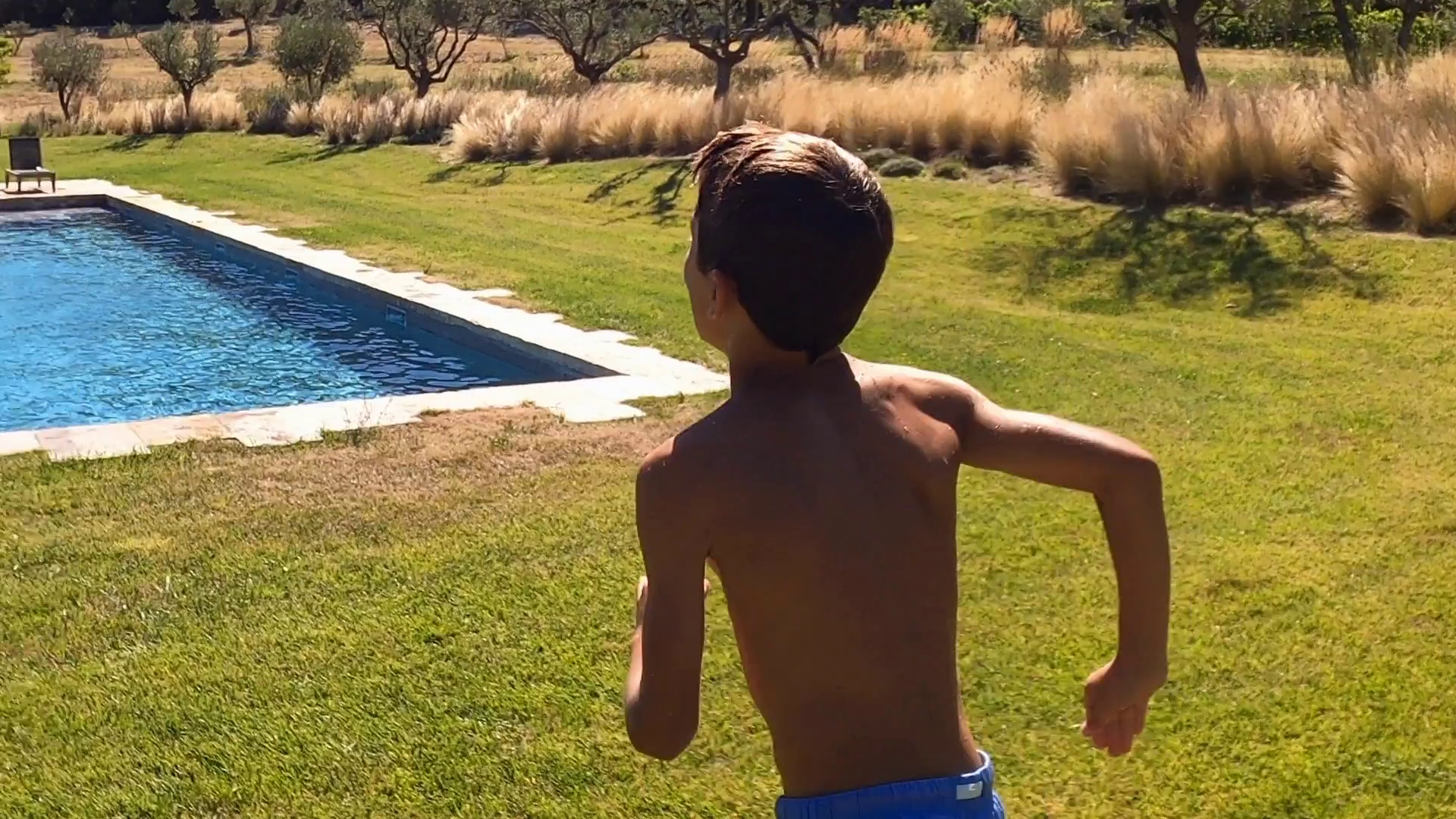Young Boy Running Jumping Into Pool Water 2 Stock Footage SBV-348778987 ...