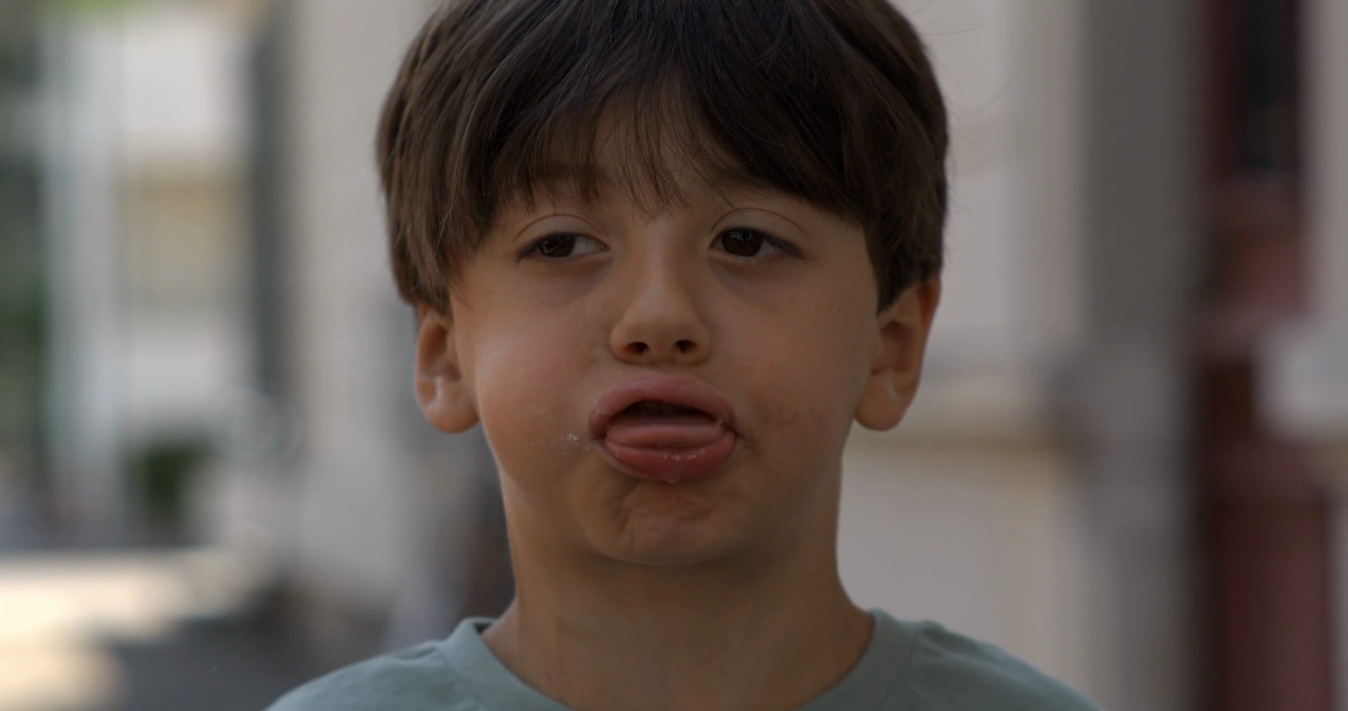 Young Boy Twisting Tongue Against Lips In Stock Footage SBV-352385250 ...