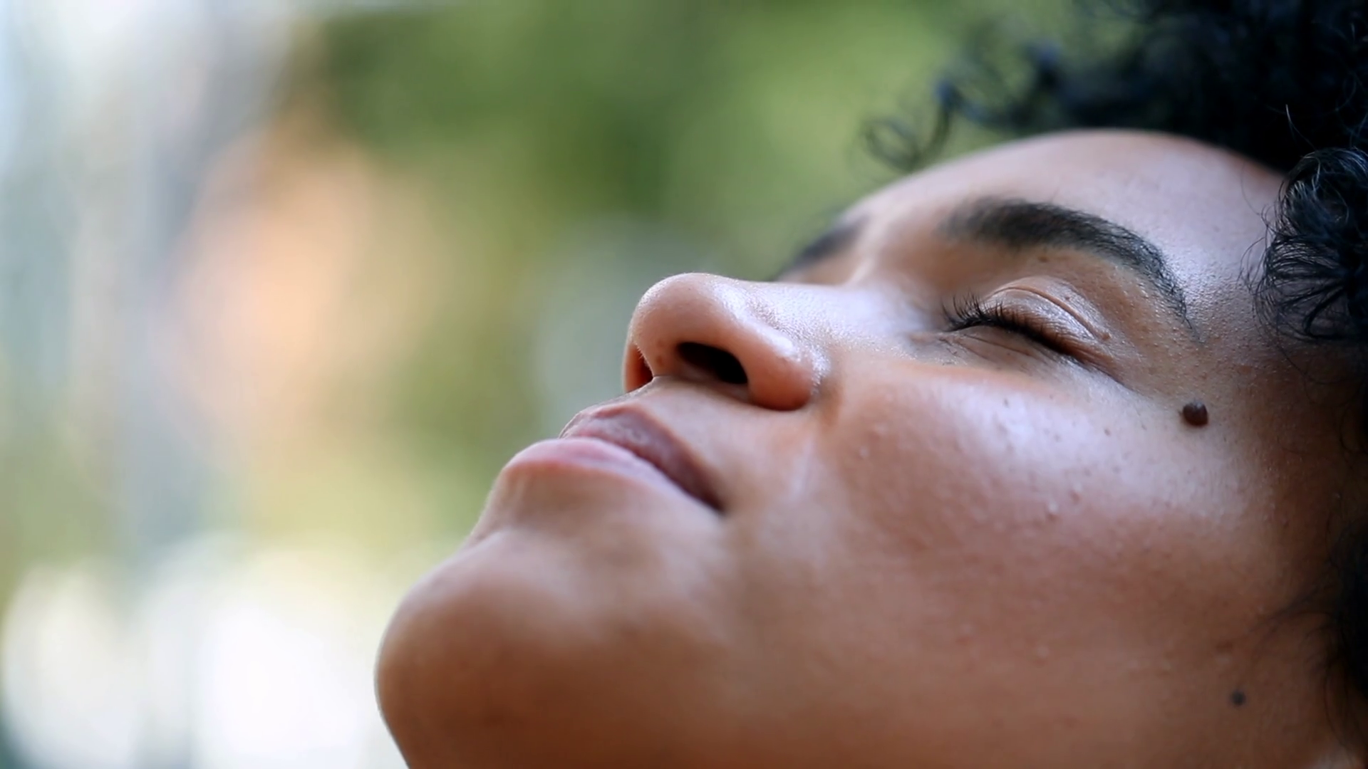 Young Woman Opening Eyes Outside Looking Up Stock Footage SBV-348477143 ...