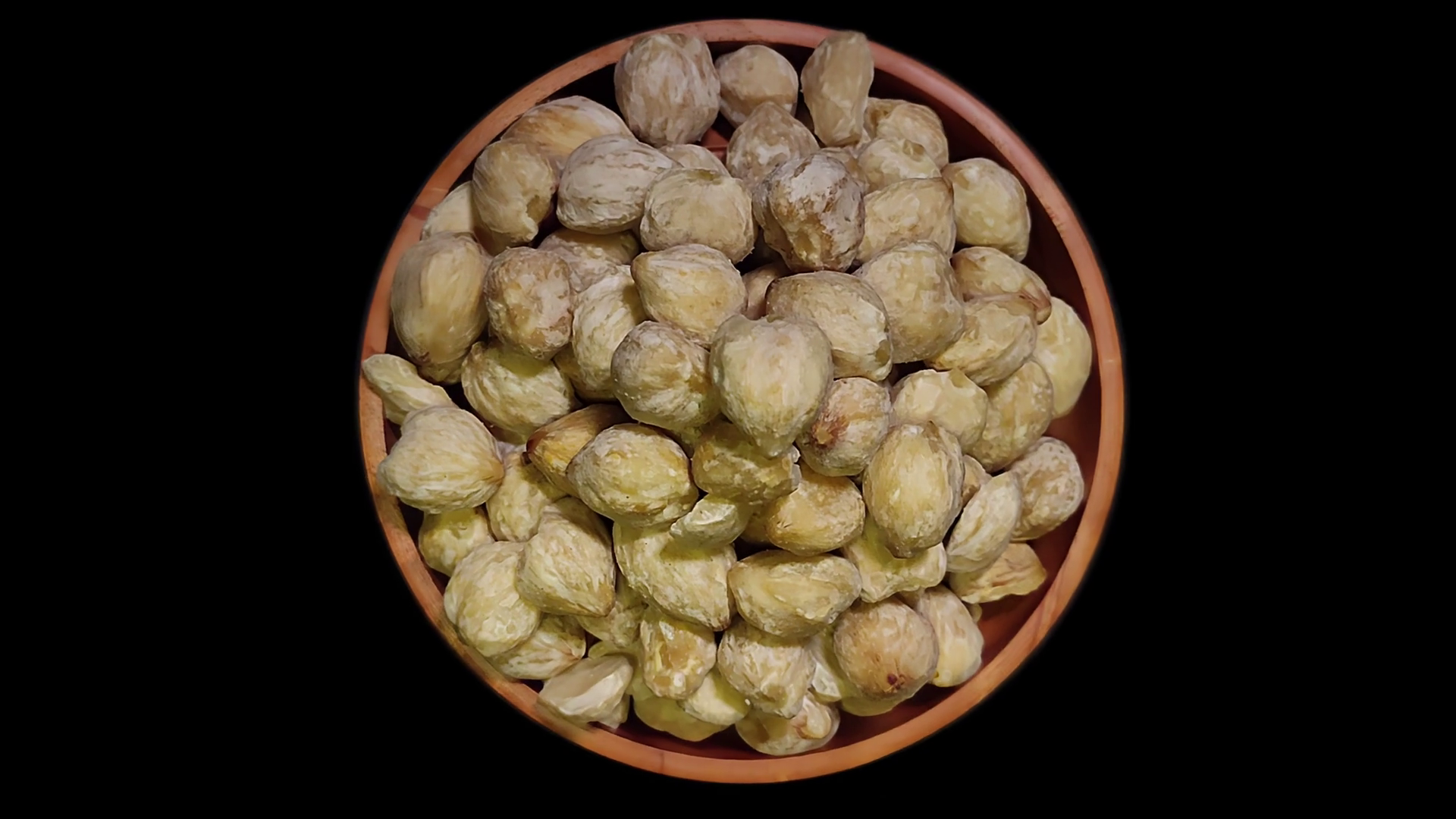 Top View Of Spinning Bowl Full Of Candlenut Stock Footage SBV-347741119 ...