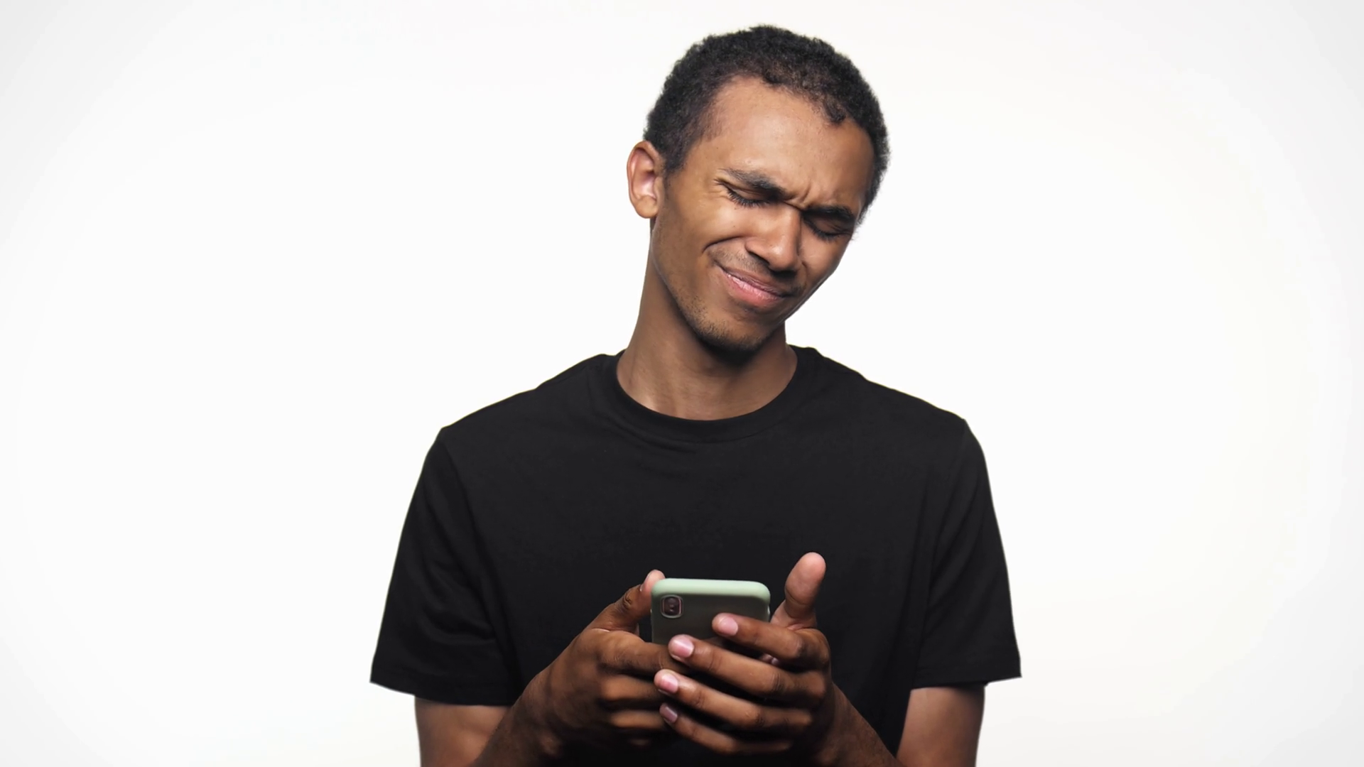 Man Reacting To Smartphone With Smirk Shrug Stock Footage SBV-351780795 ...