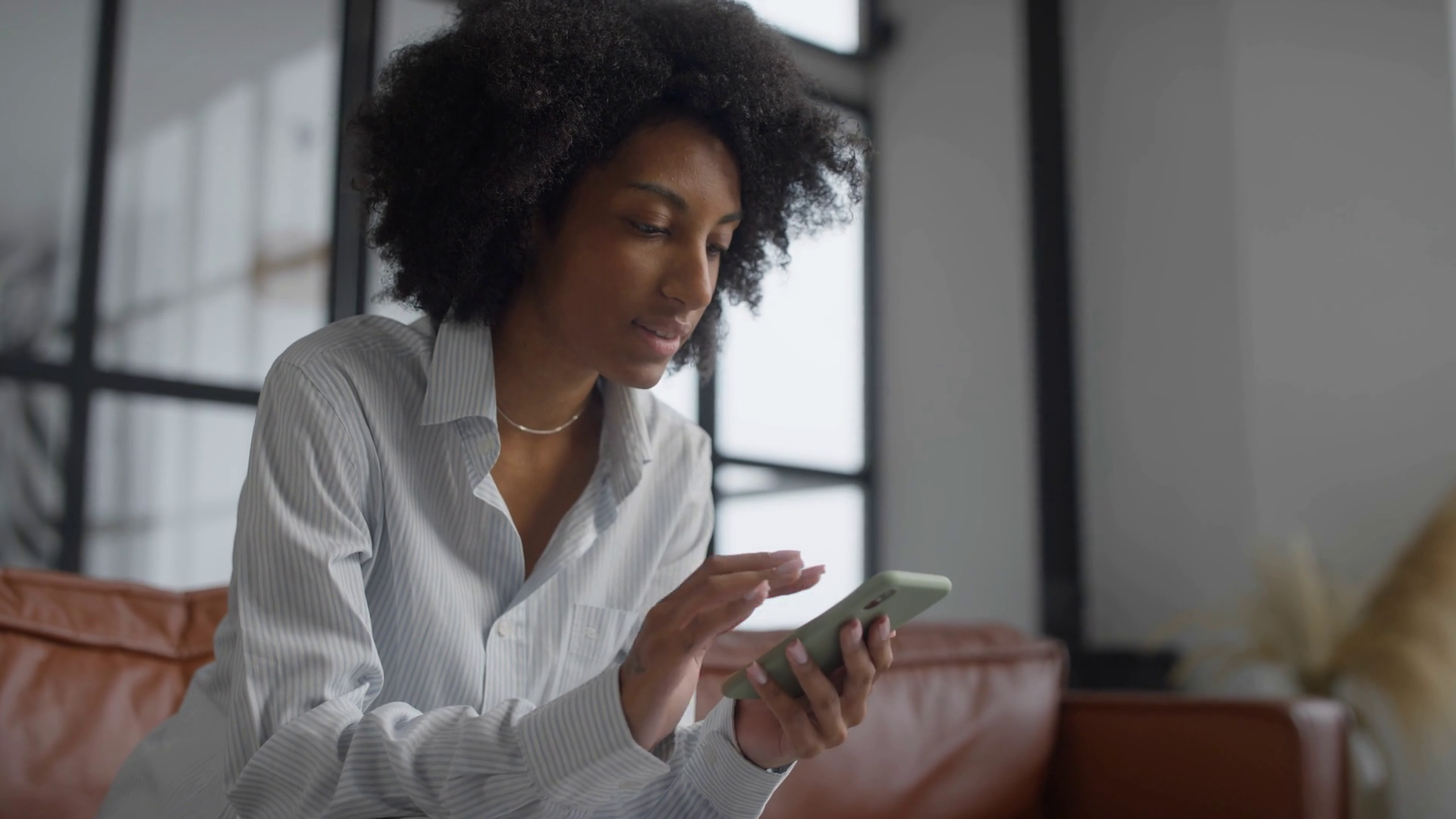 Young Adult Woman Browsing On Smartphone At Stock Motion Graphics SBV ...