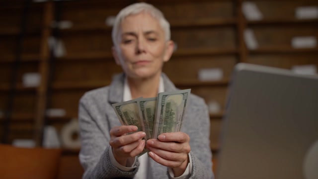 Woman Dollar Stock Footage: Royalty-Free Video Clips - Storyblocks
