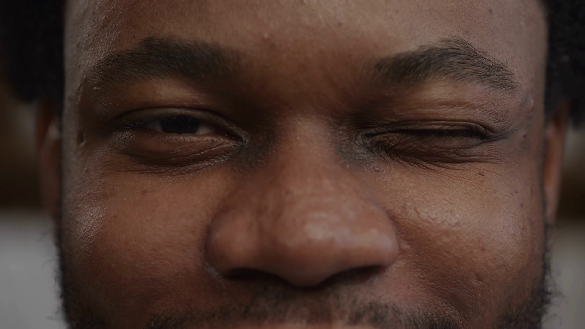 Man Wink In Extreme Close Up Stock Footage SBV-347669748 - Storyblocks