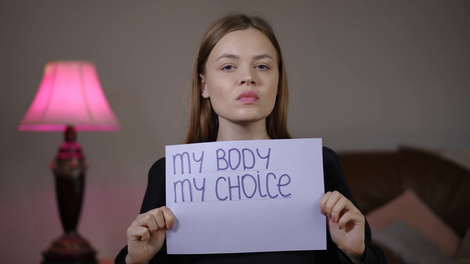 Young Caucasian Woman Holding Sign 'my Body Stock Footage SBV-353282759 ...