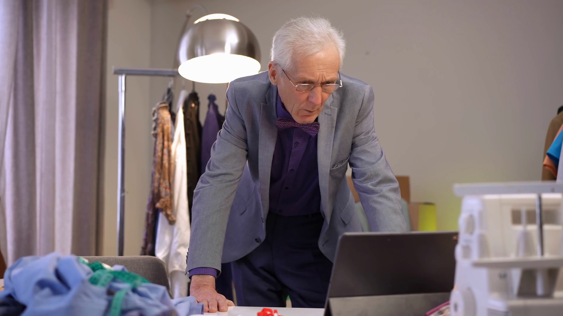 An Elderly Stylish Man Leaning Over Table To Stock Footage SBV ...