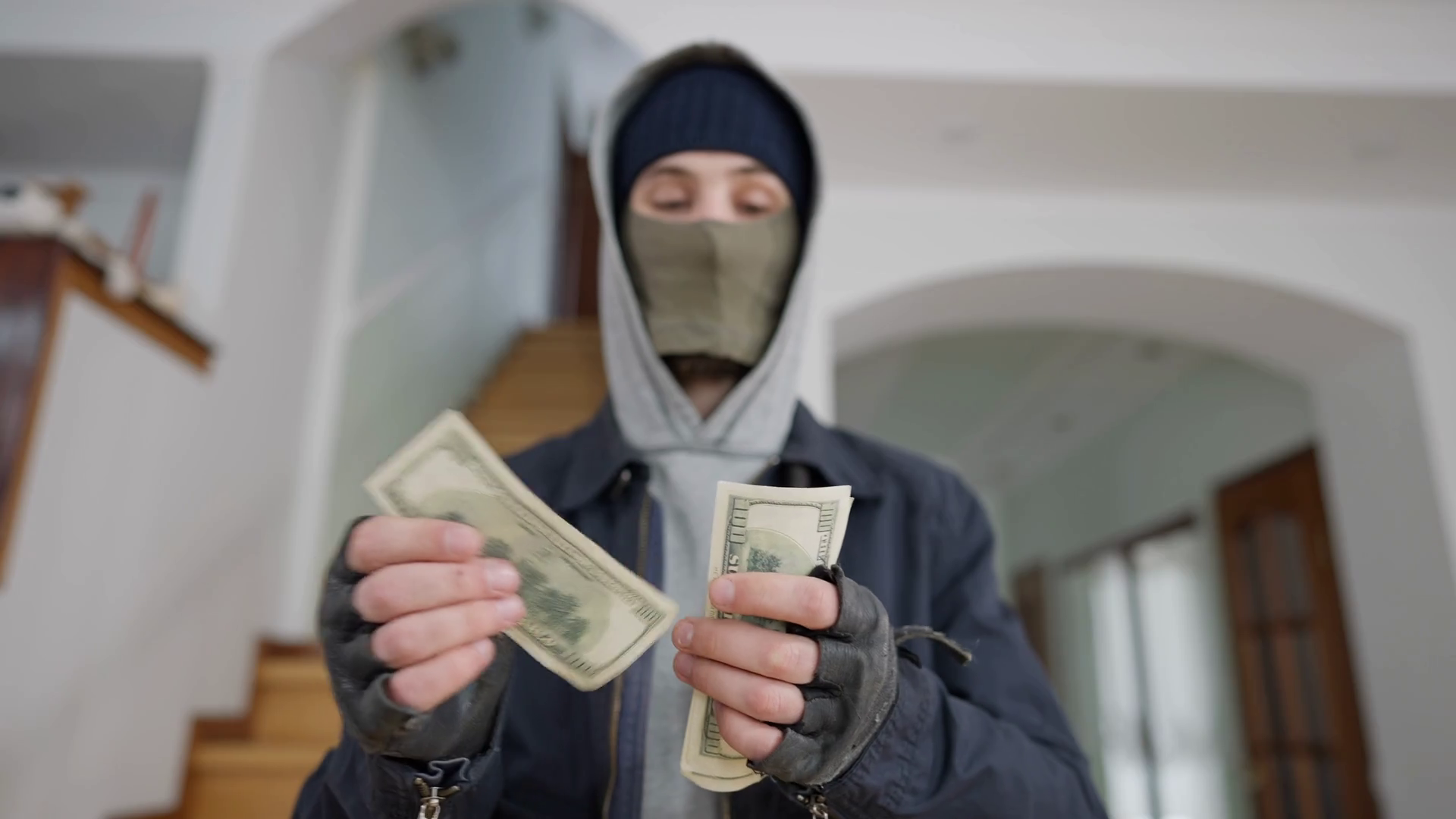 Blurred Burglar In Mask Counting Dollars Stock Footage SBV-346448424 ...