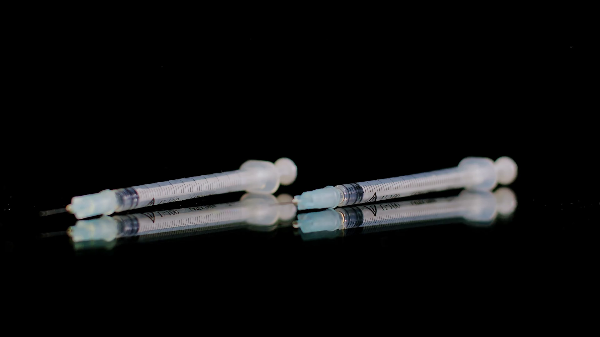 Two Syringes On Table With White Orange Stock Footage SBV-348485100 ...