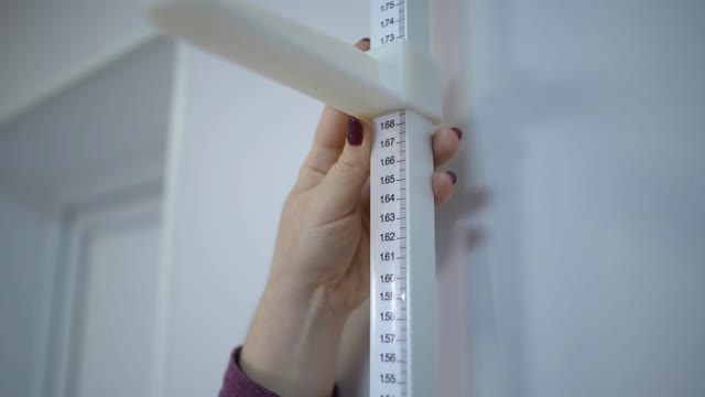 Measuring The Room Stock Footage: Royalty-Free Video Clips - Storyblocks