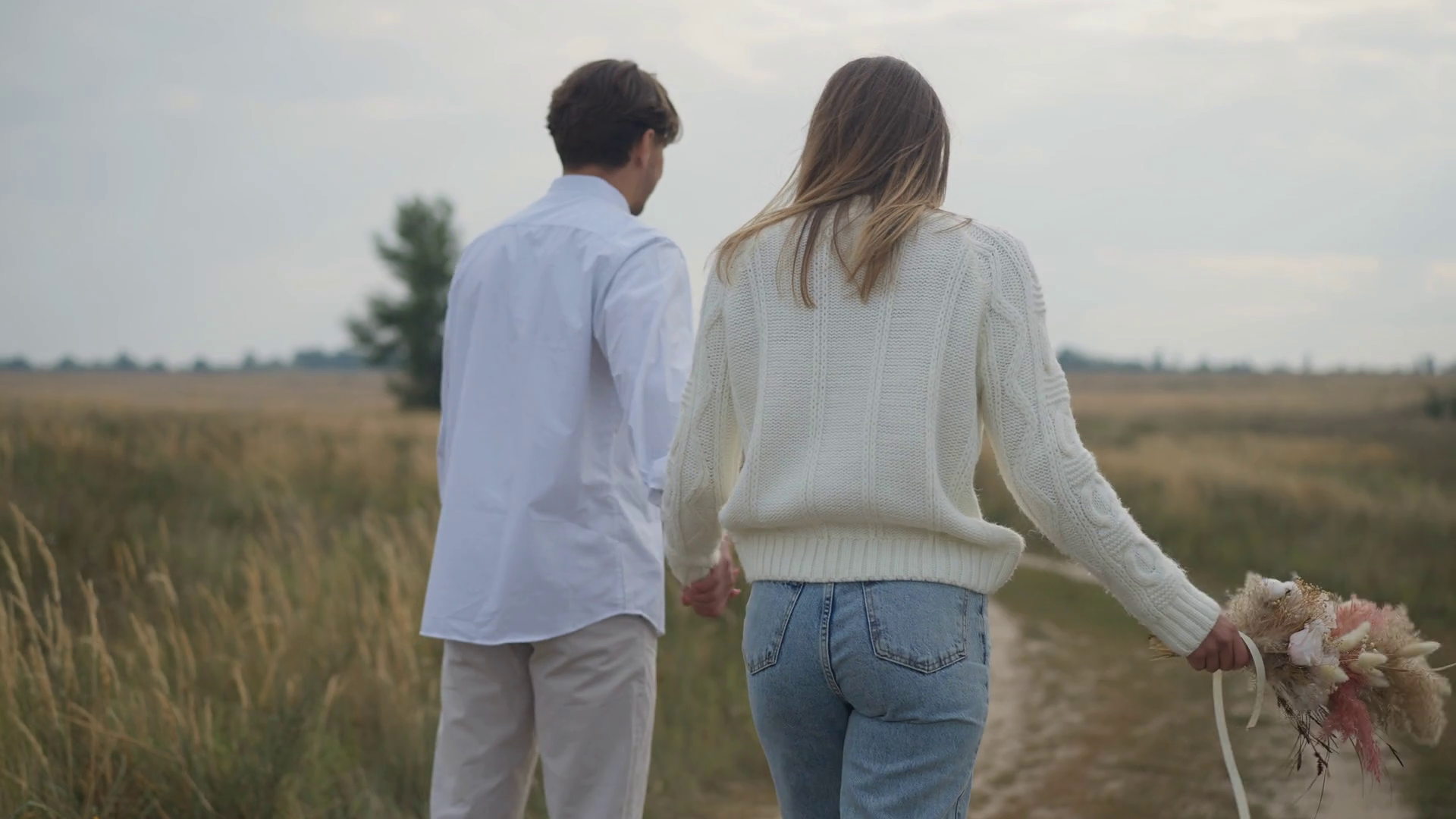 Back View Joyful Young Couple Holding Hands Stock Footage SBV-348427459 ...