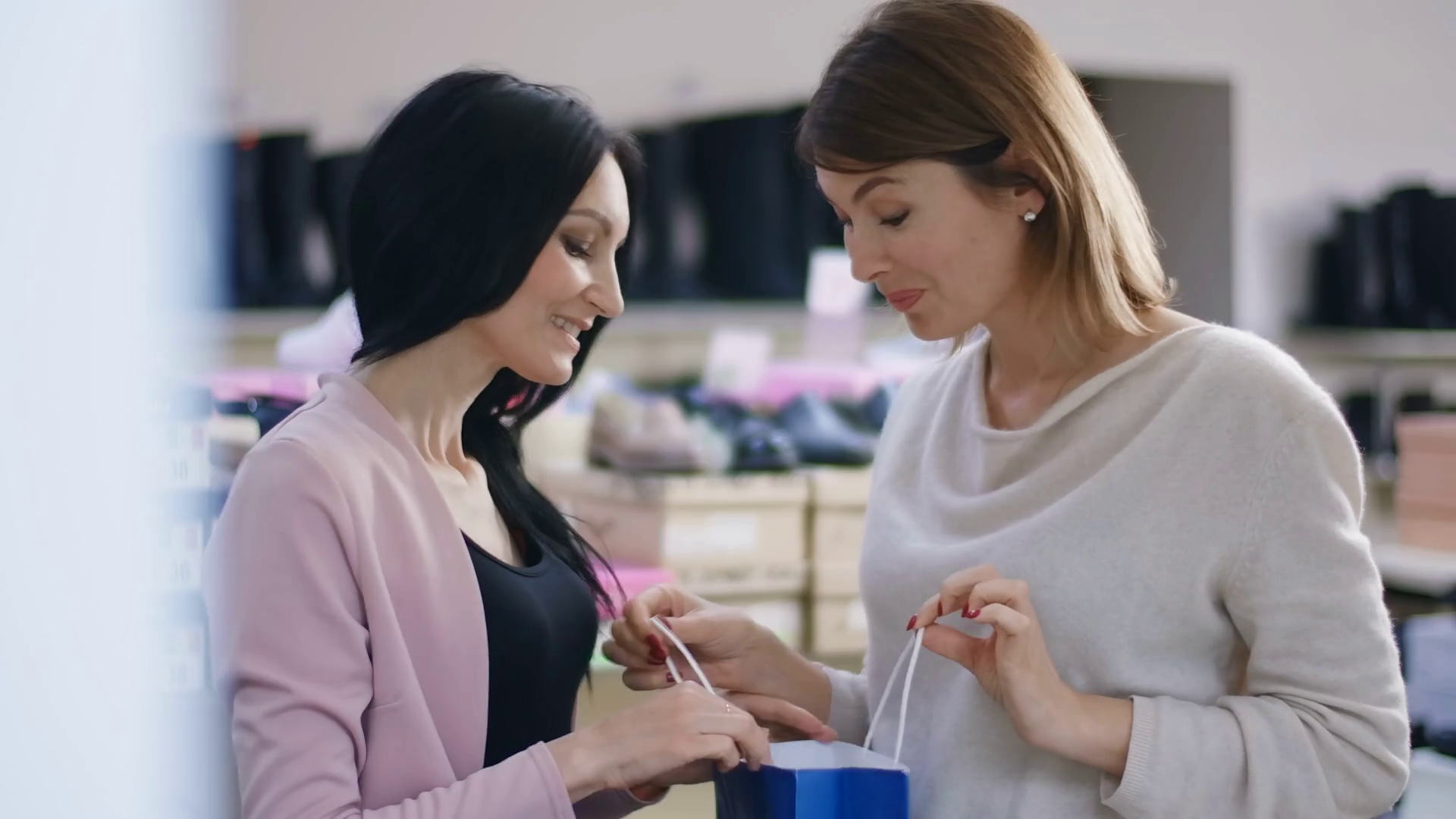 Satisfied Woman Bragging New Shoes To Friend Stock Footage SBV ...