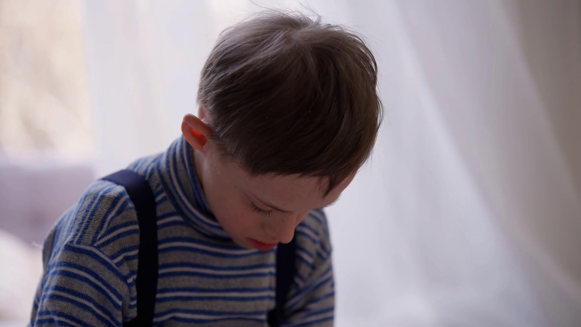 Portrait Of Concentrated Curios Autistic Boy Stock Footage SBV ...