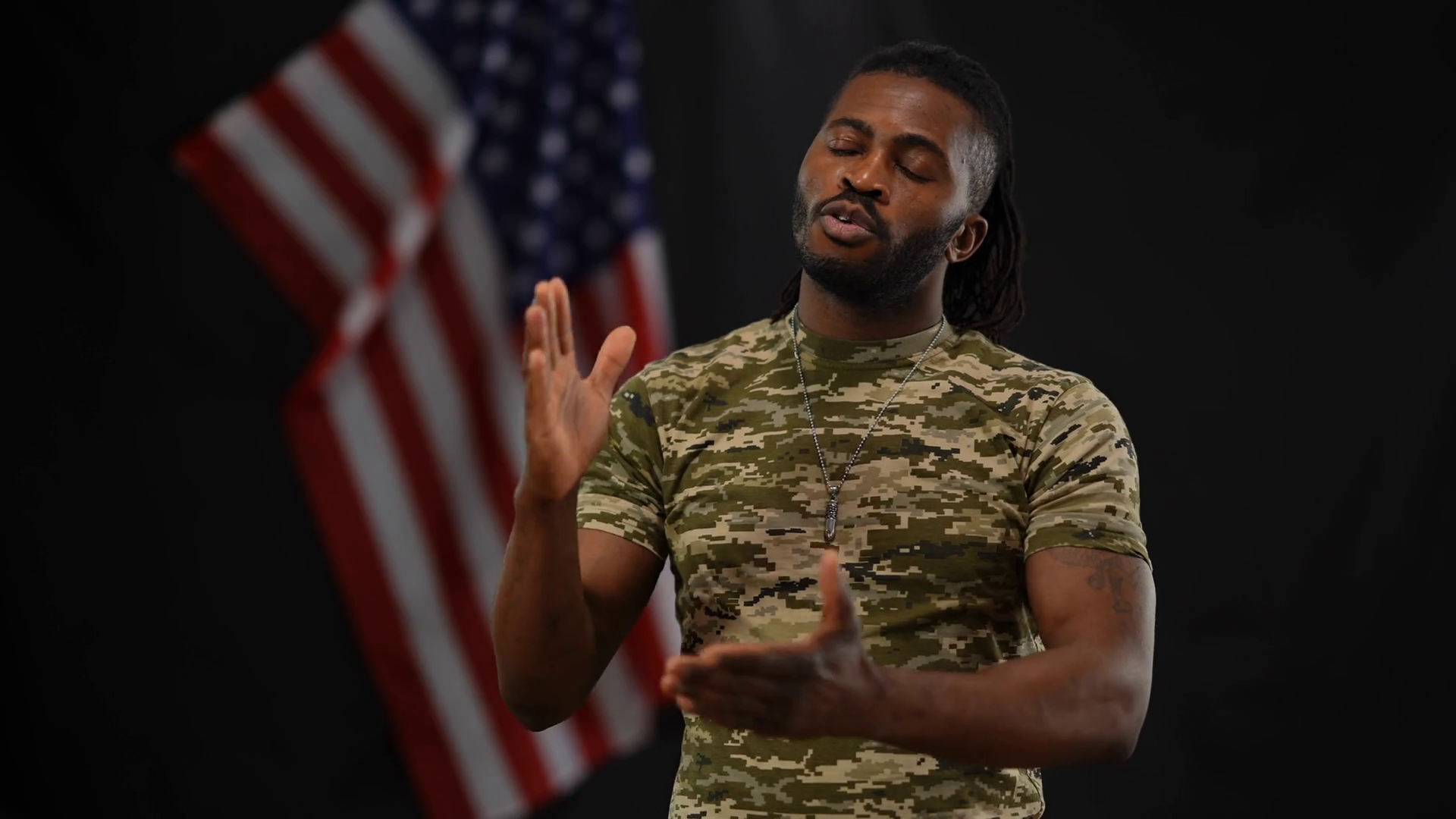 Handsome bearded African American lieutenant sergeant persuading ...