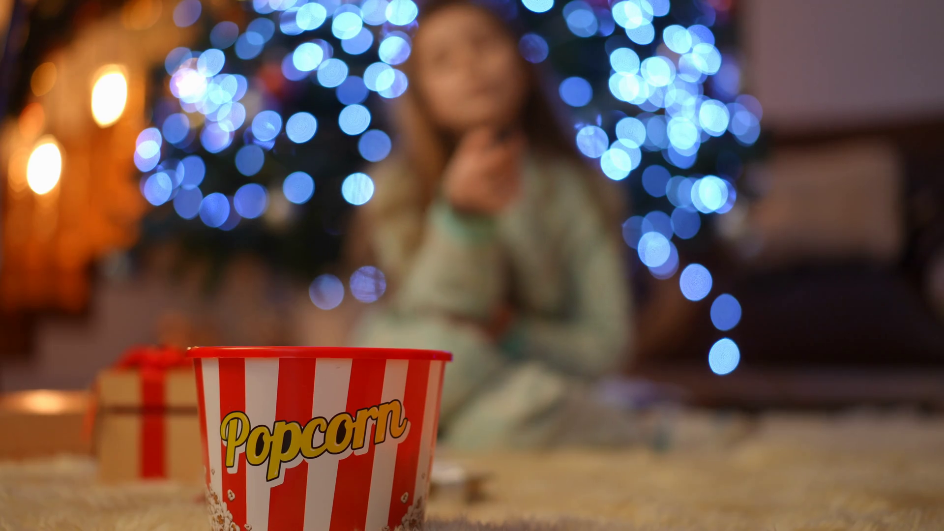A Popcorn Glass Is In Focus In Foreground In Stock Footage SBV ...