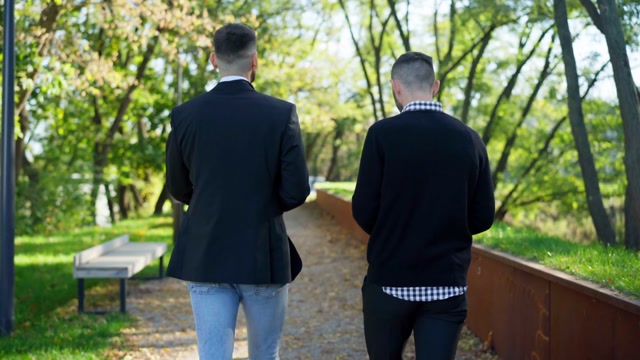 Two Men Walking Stock Footage: Royalty-Free Video Clips - Storyblocks