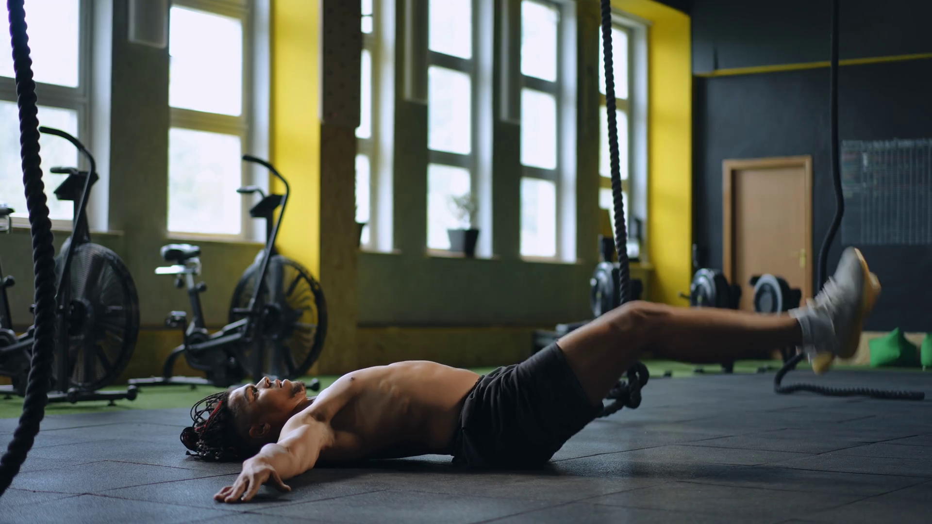 Young Man Lifting Legs Lying On Back In Stock Footage SBV-348790996 ...