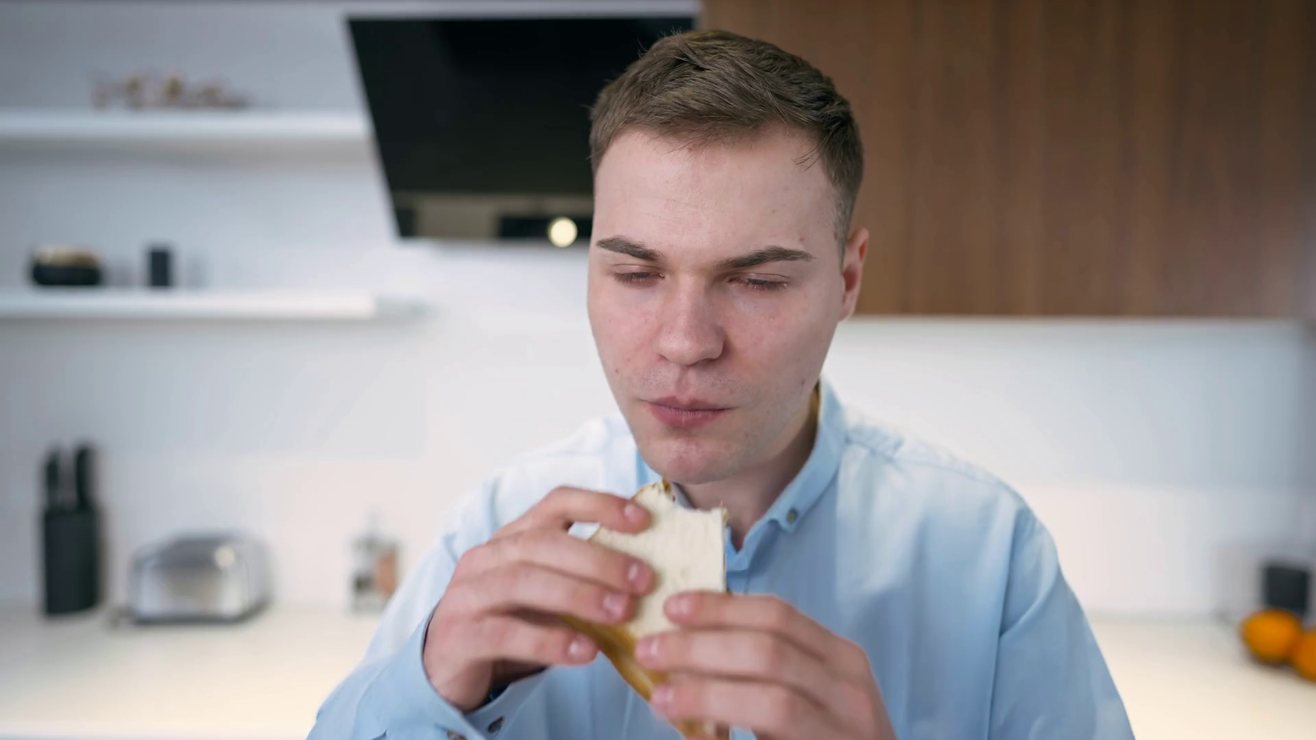Hungry Young Man Eating Sandwich In Slow Stock Footage SBV-348478008 ...