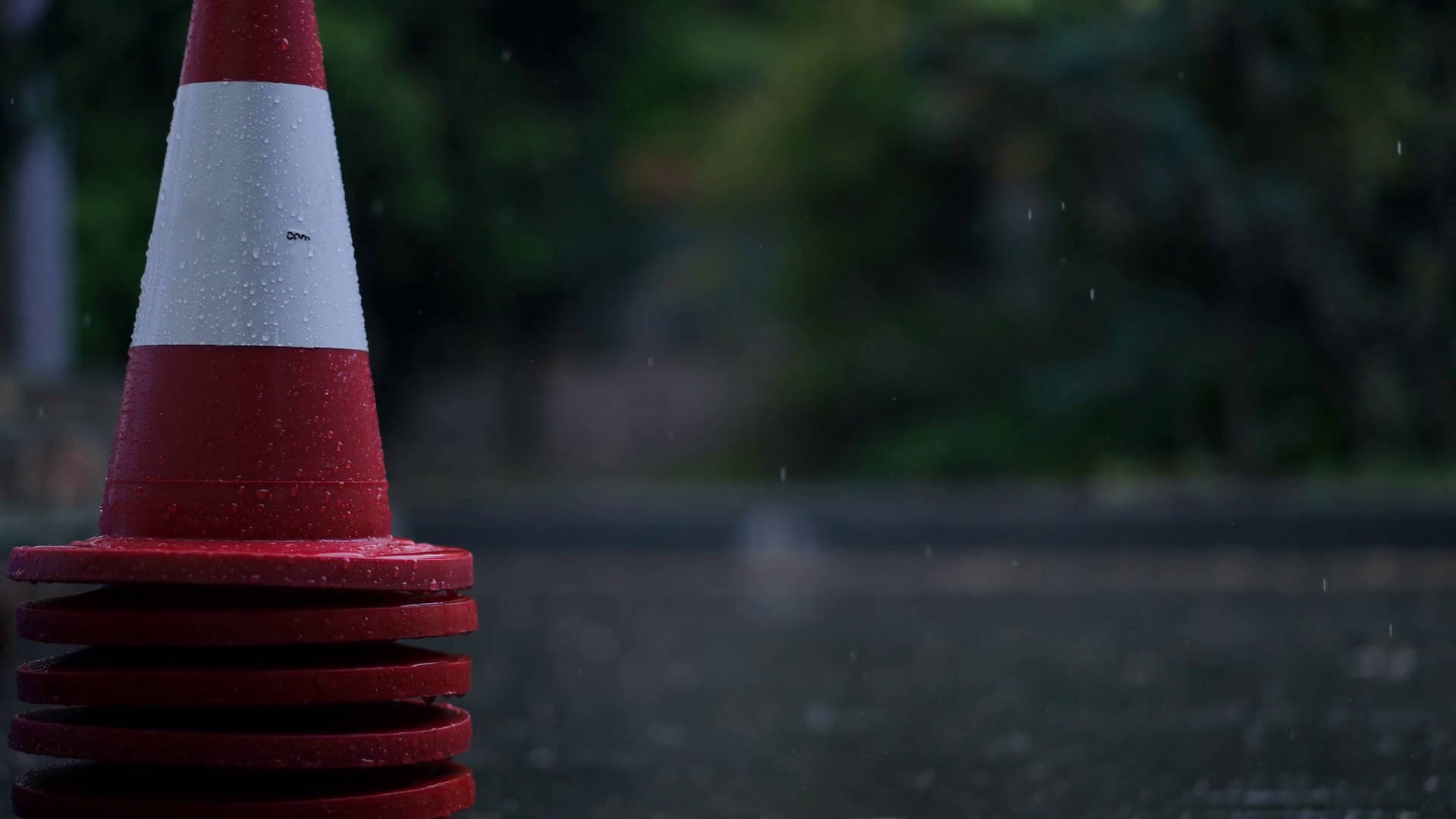 Red White Road Cone On Left With Rain Stock Footage SBV-347468033 ...