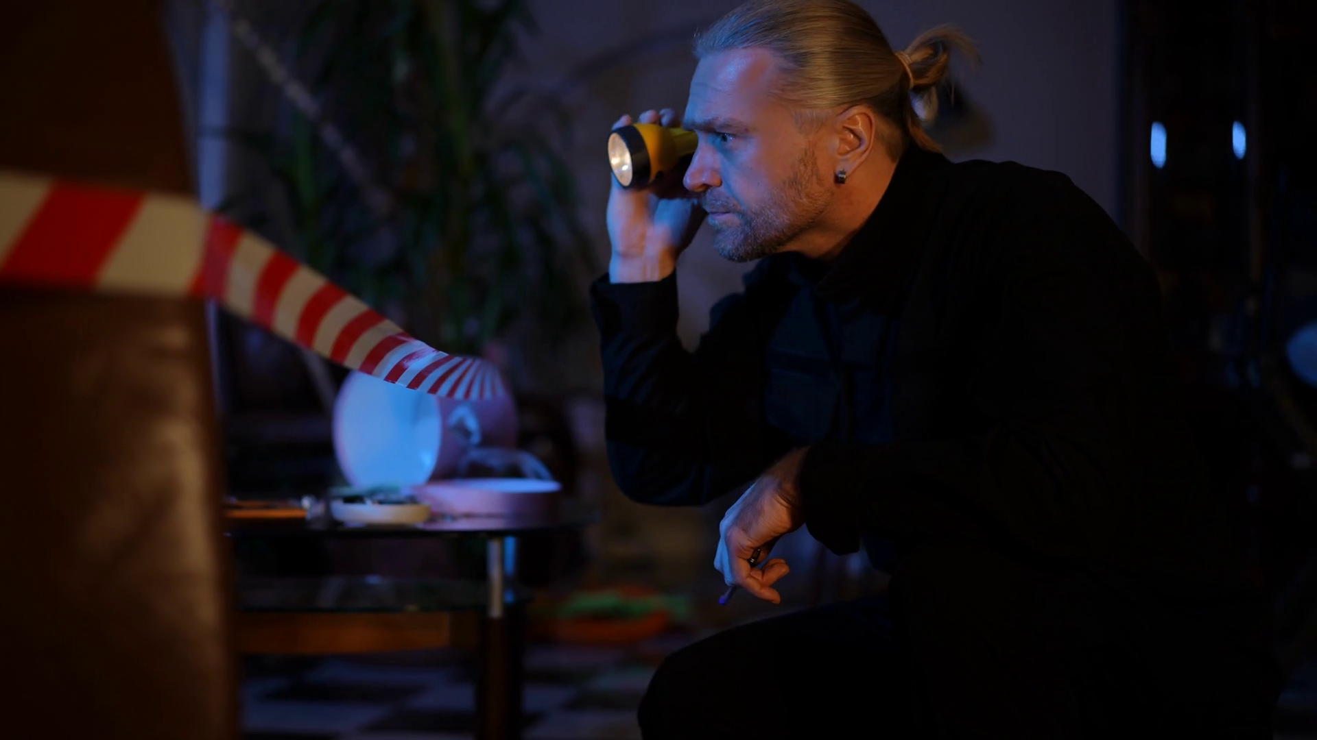 Side view portrait of serious concentrated cop investigating crime ...