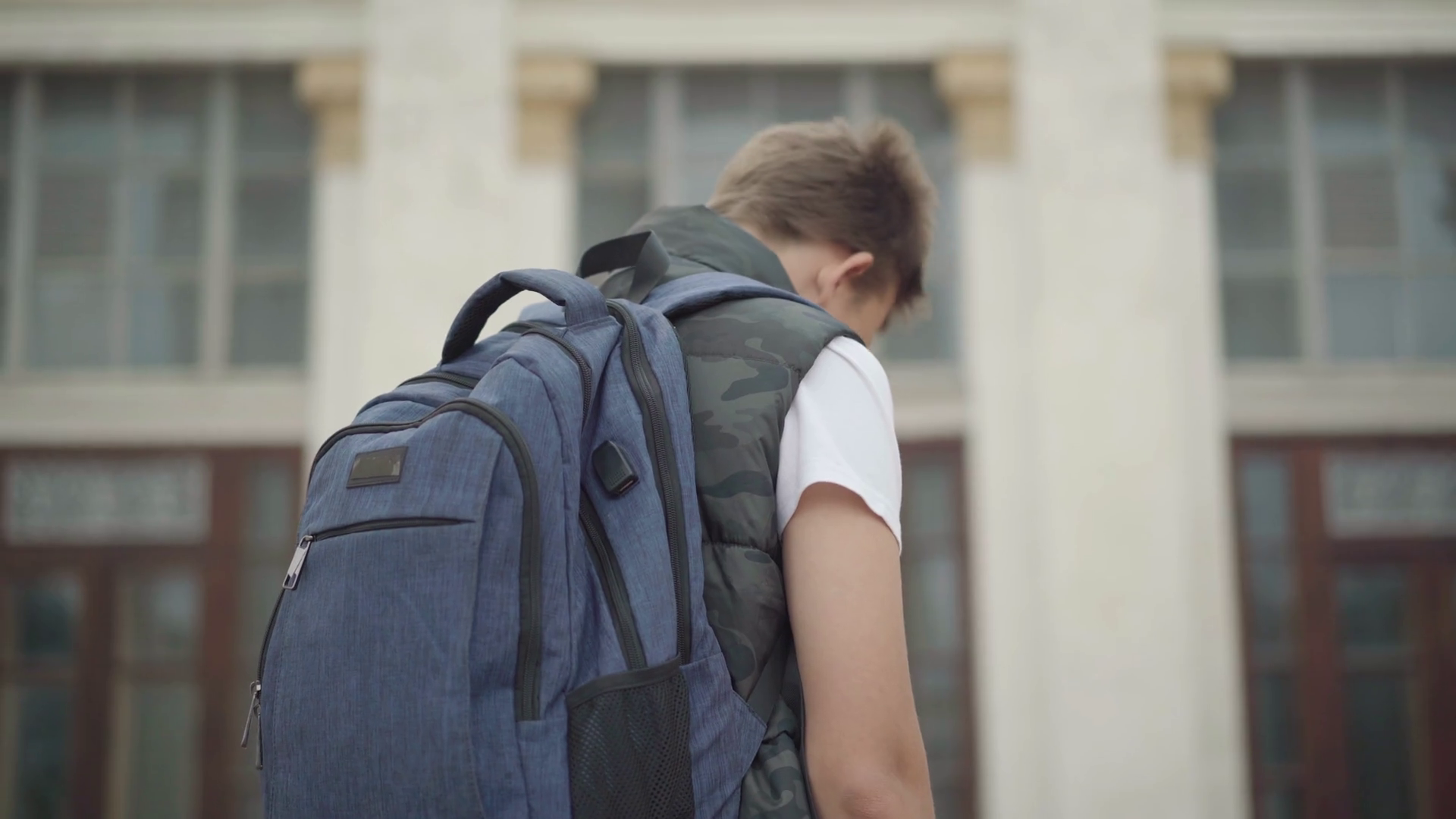 Back View Of Upset Schoolboy Standing In Stock Footage SBV-338780617 ...