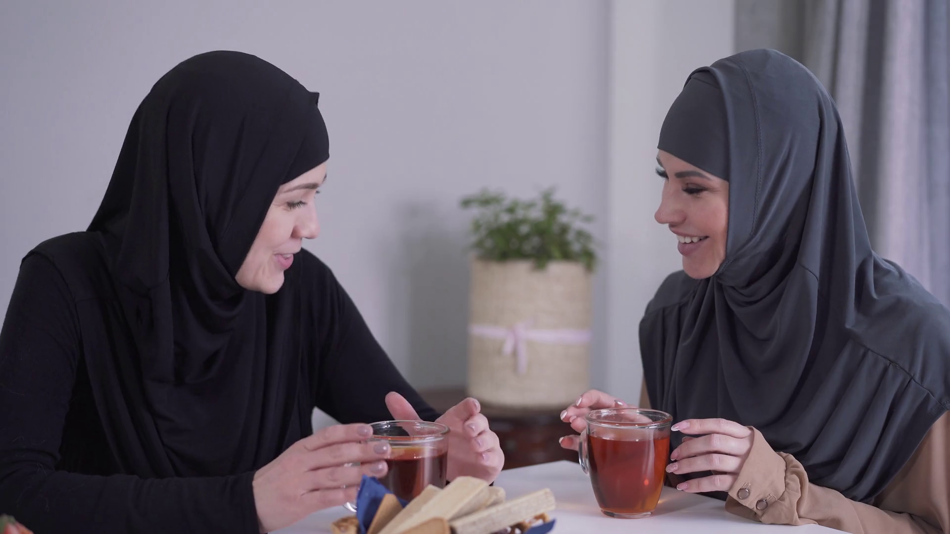 Close-up Of Two Happy Muslim Women Talking Stock Footage SBV-338125125 ...