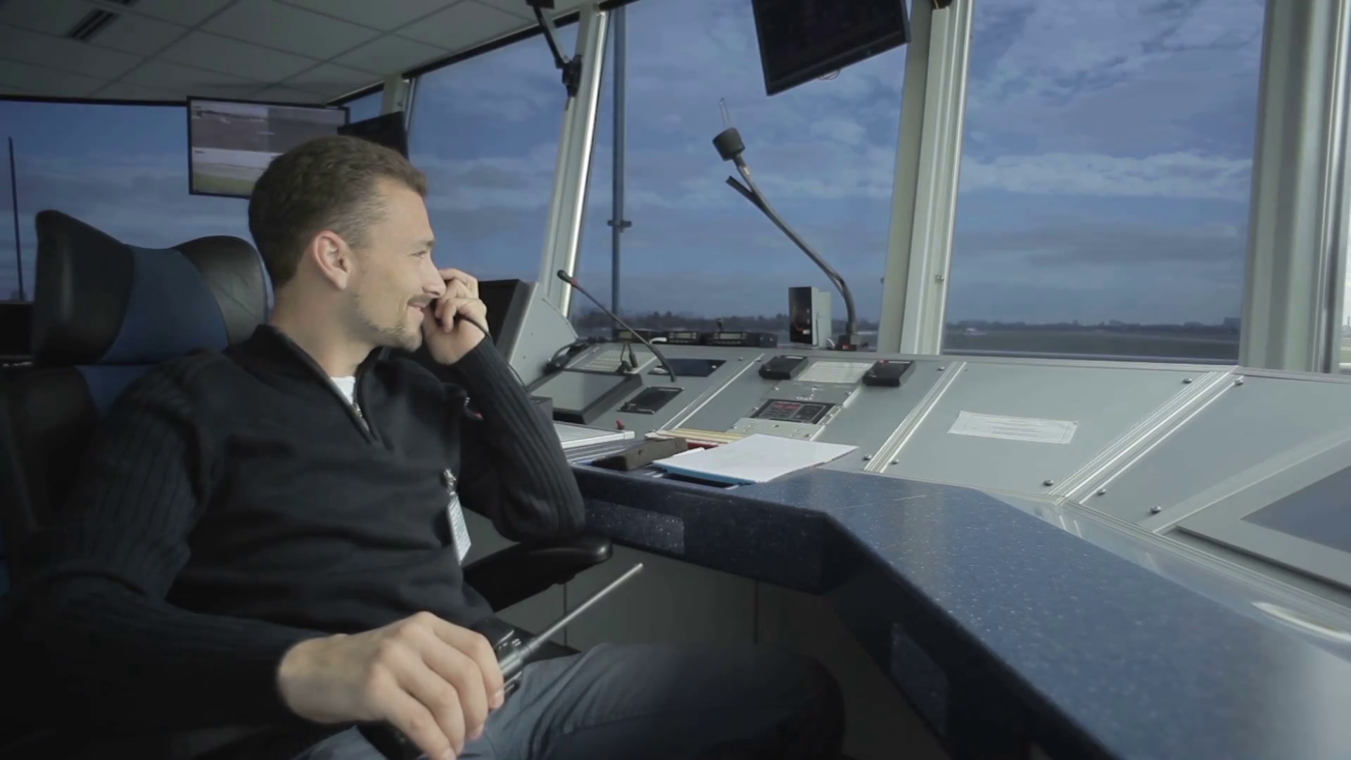 Dispatcher control the airplanes in control tower in airport with ...
