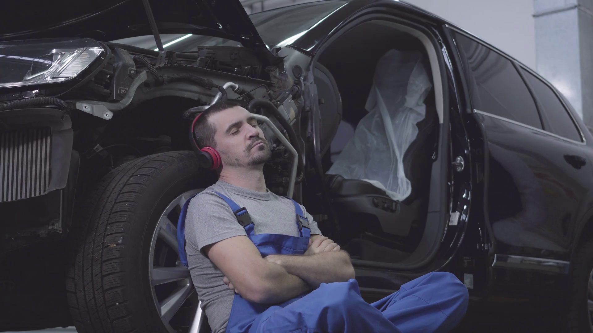 Tired Young Man Resting At Auto Repair Shop Stock Footage SBV-338071408 ...