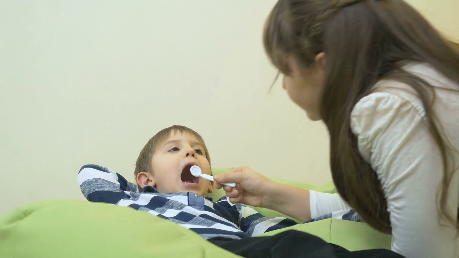 Child Examining Boy's Mouth With Toy Medical Stock Footage SBV ...
