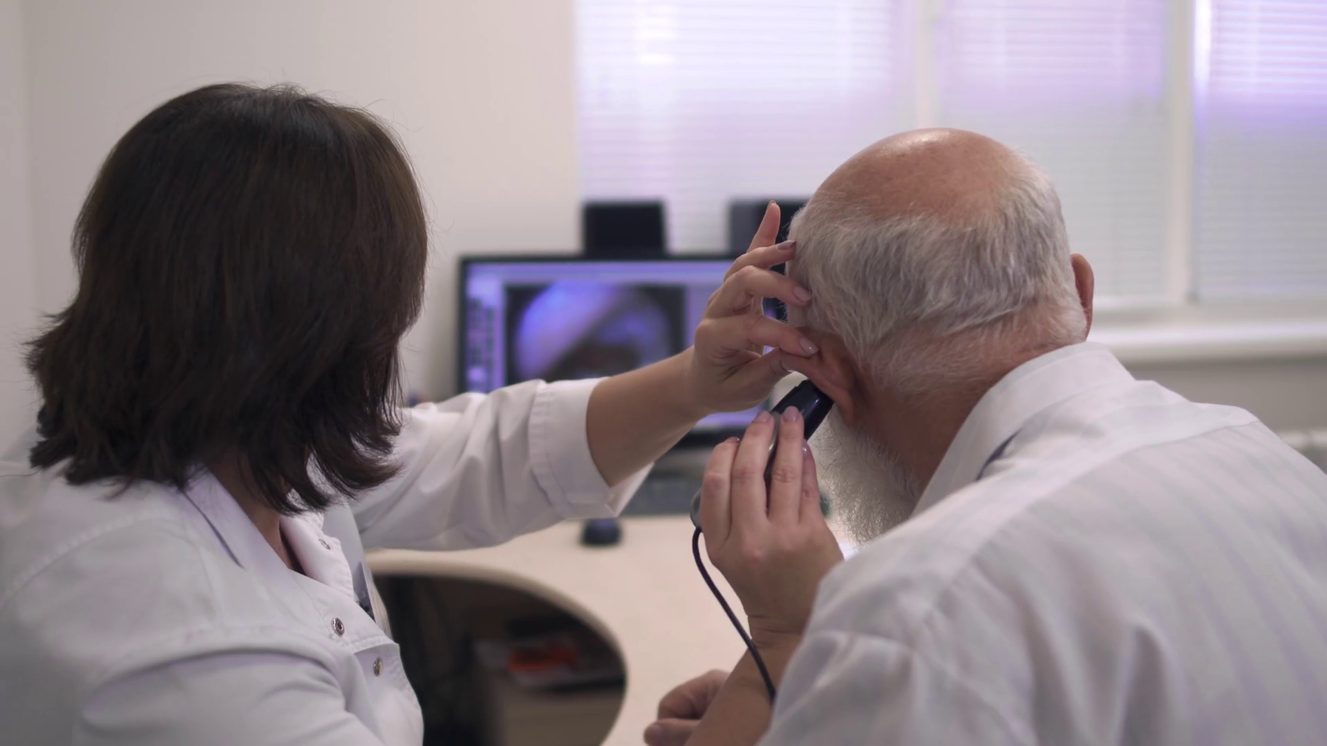 Medical Professional Tests Ear Of Adult Man Stock Footage SBV-326163994 ...