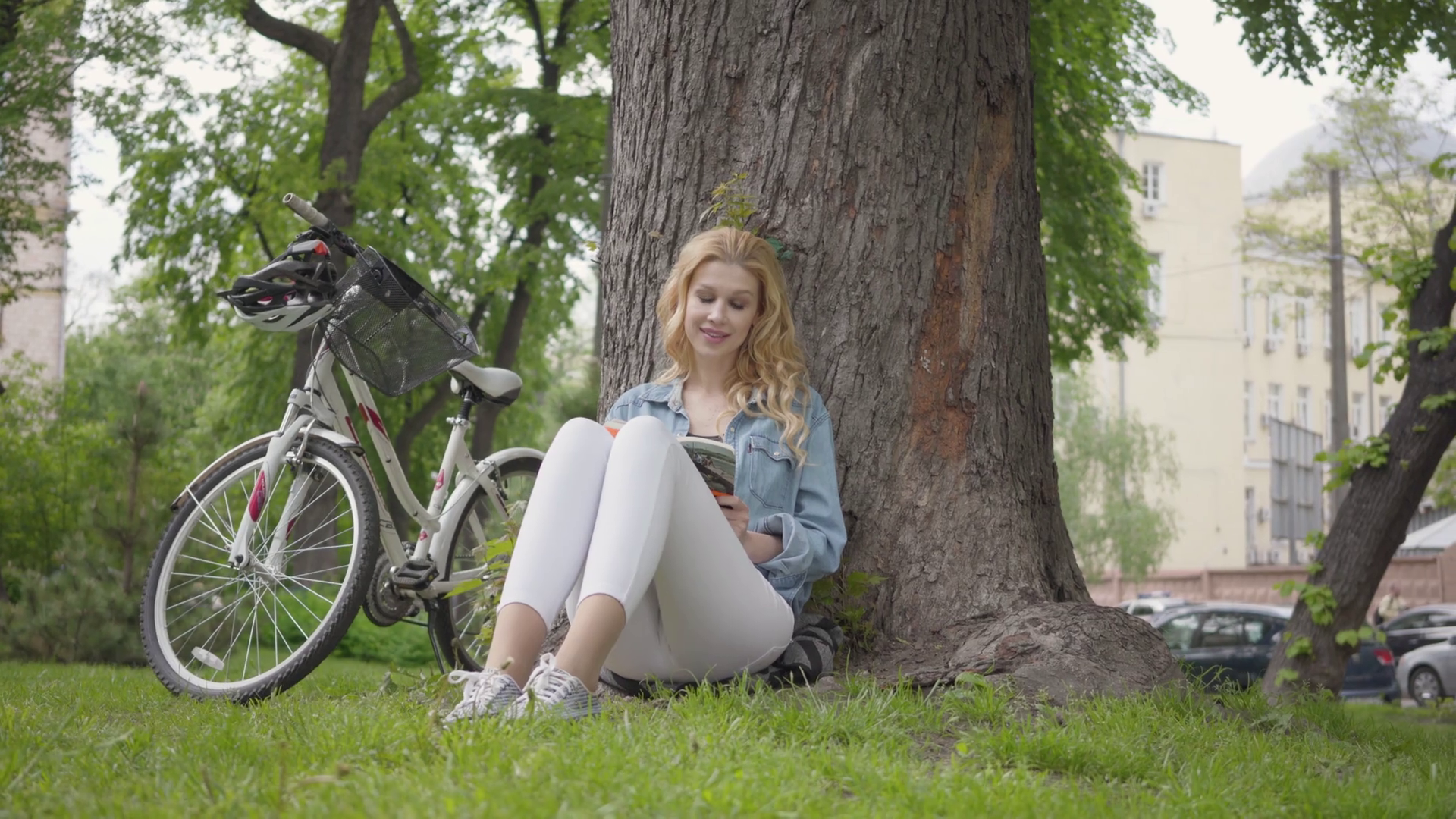 Pretty Smiling Woman Sitting Under Old Tree Stock Footage SBV-335113230 ...