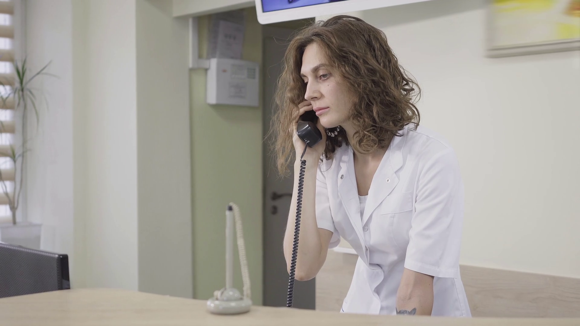 Receptionist Receiving Call In Hospital Stock Footage SBV-338583847 ...