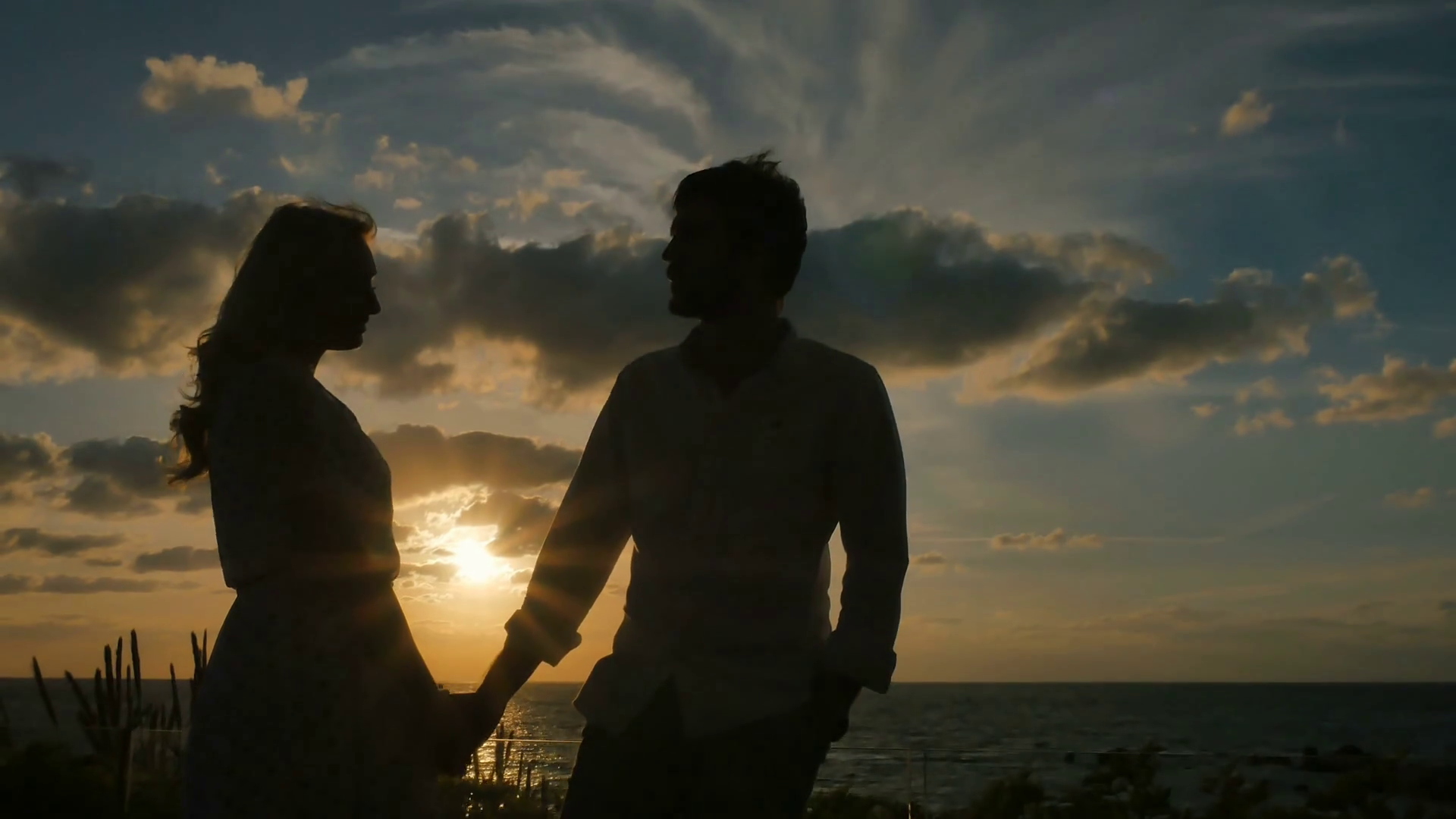 Silhouettes Of Couple At Sunset Stock Footage SBV-315616743 - Storyblocks