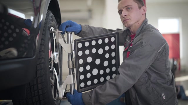 Wheel Alignment Machine Stock Footage: Royalty-Free Video Clips ...