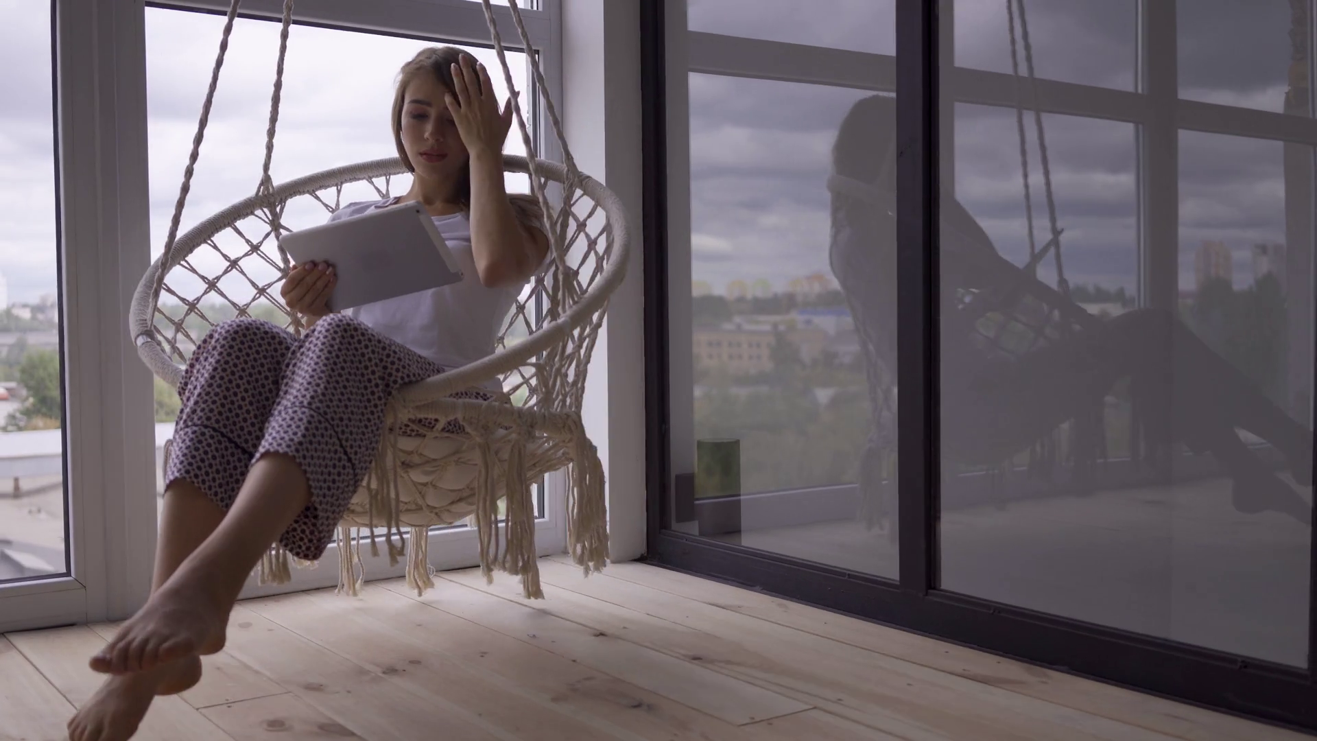 Young Woman Enjoying Swinging Chair Window Stock Footage SBV-337702880 ...