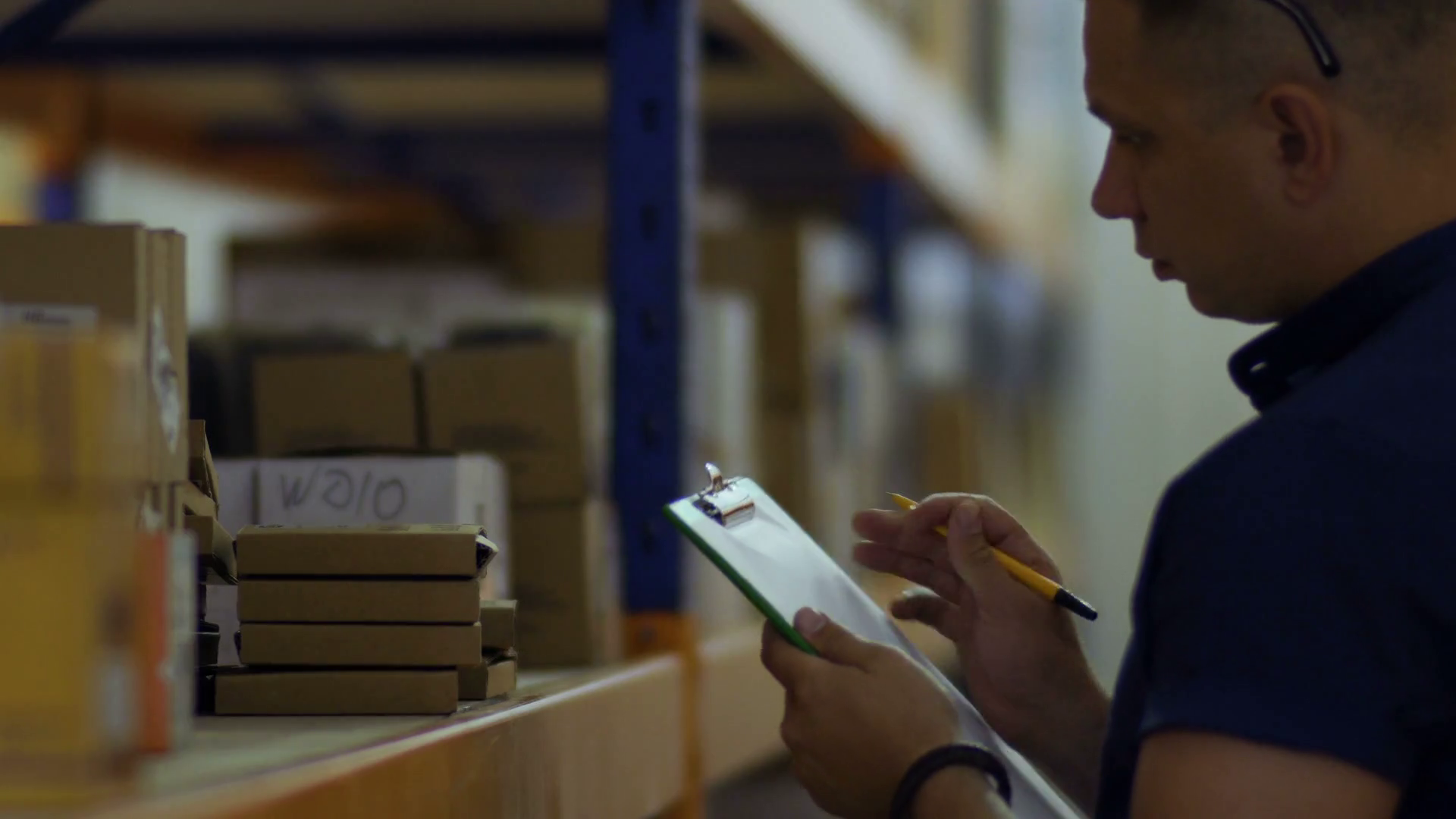 Supervisor Check Packages On Shelves In Stock Footage SBV-324500373 ...