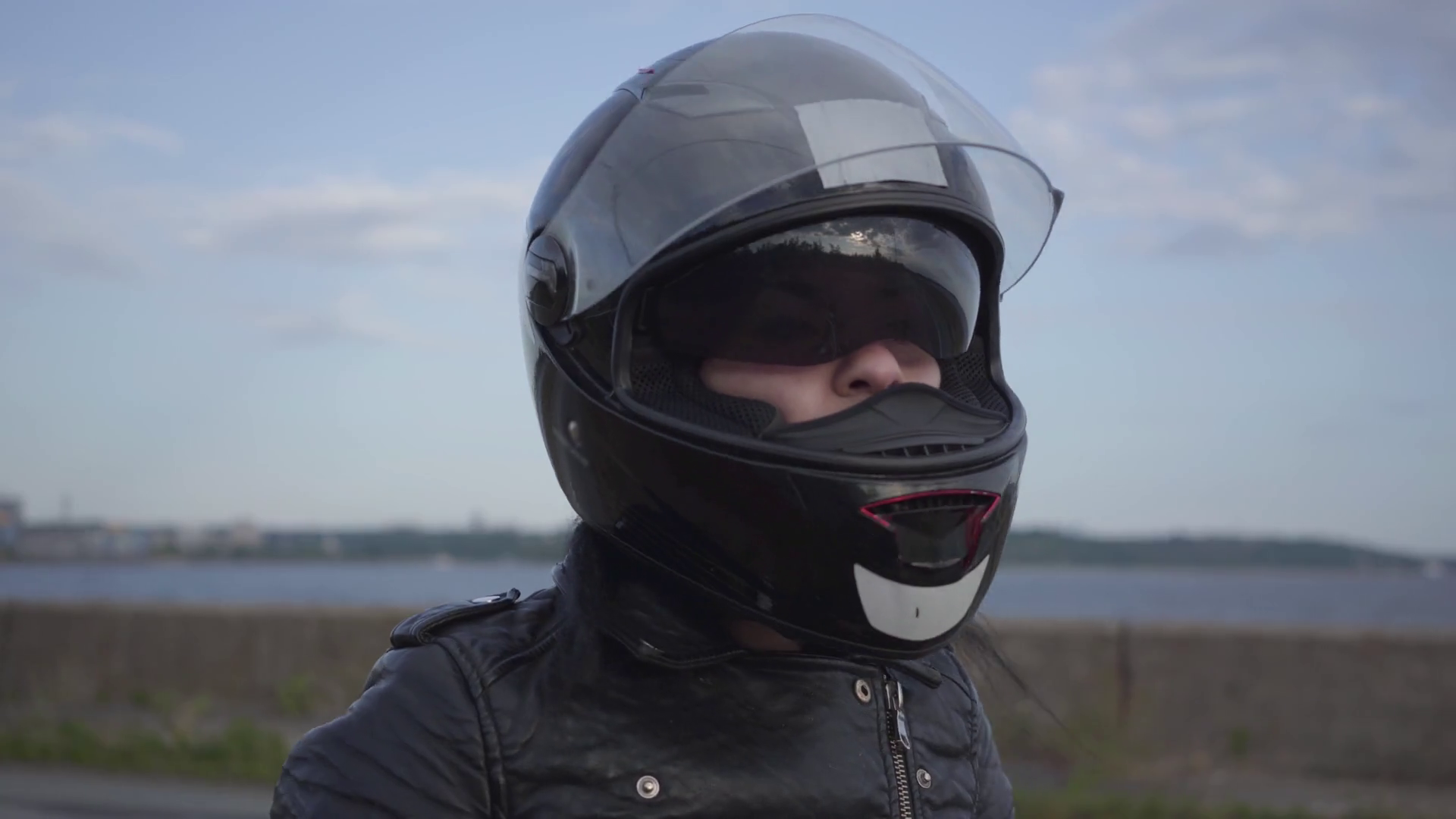 Smiling Woman Taking Off Motorcycle Helmet Stock Footage SBV-336612081 ...